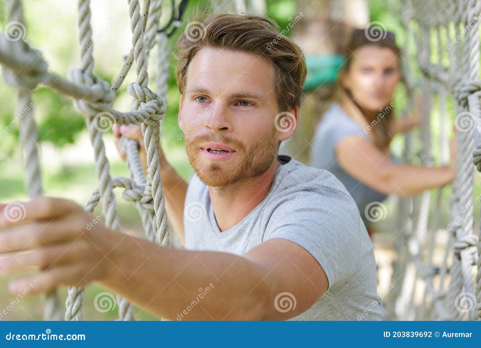 Young Man at Climbing Park or High Rope Garden Stock Photo - Image of ...
