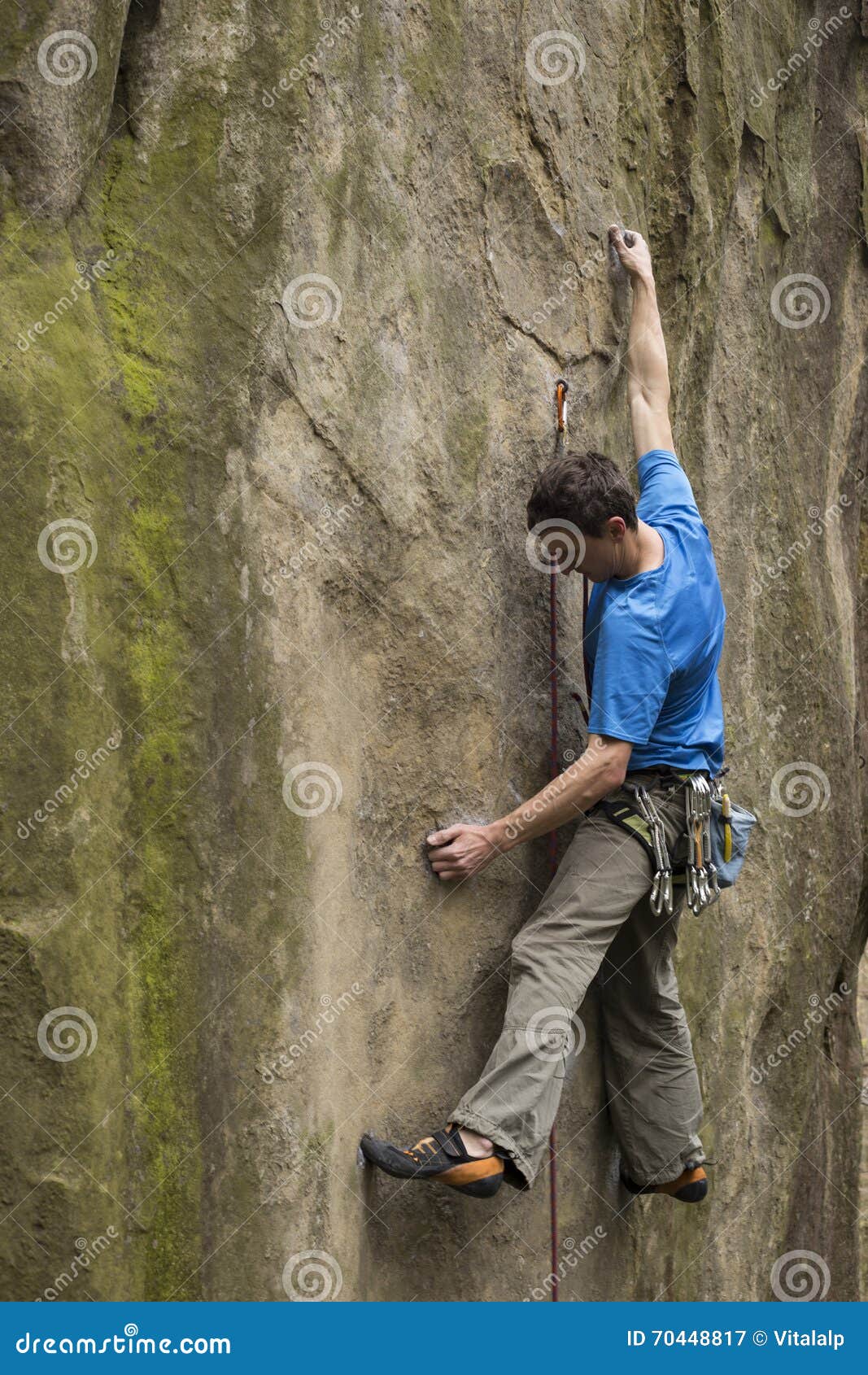 Young Man Climbs on a Cliff with a Rope. Stock Image - Image of effort ...