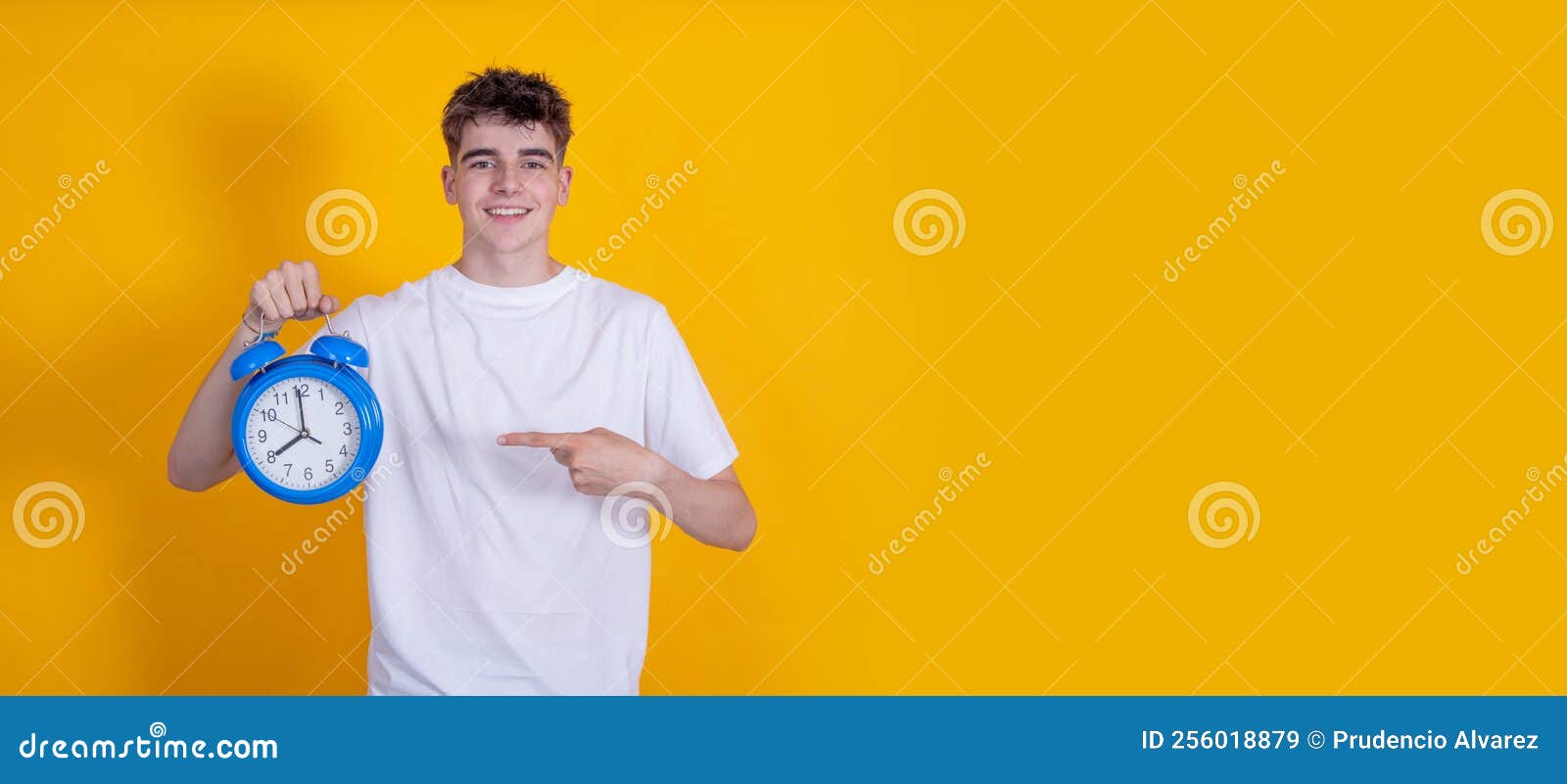 Young man with clock stock image. Image of gesture, point - 256018879