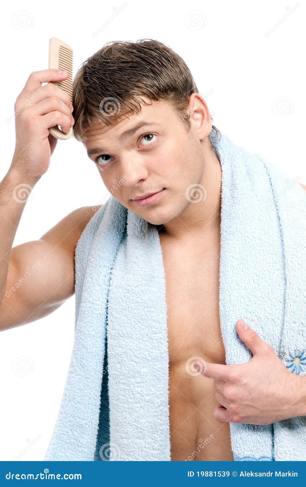 Young man combing his hair stock image. Image of clean - 19881539