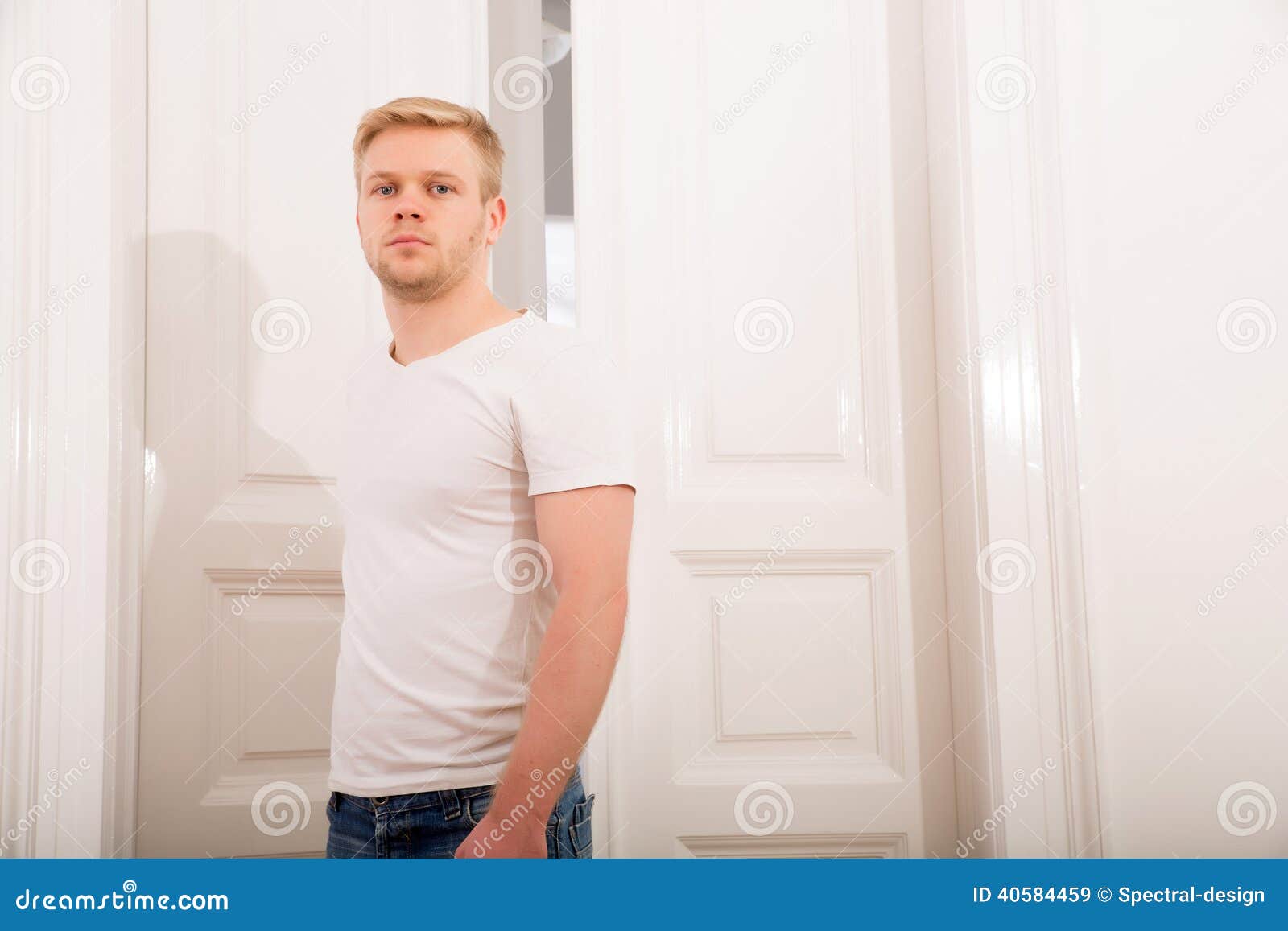 Young man coming home stock image. Image of entrance - 40584459