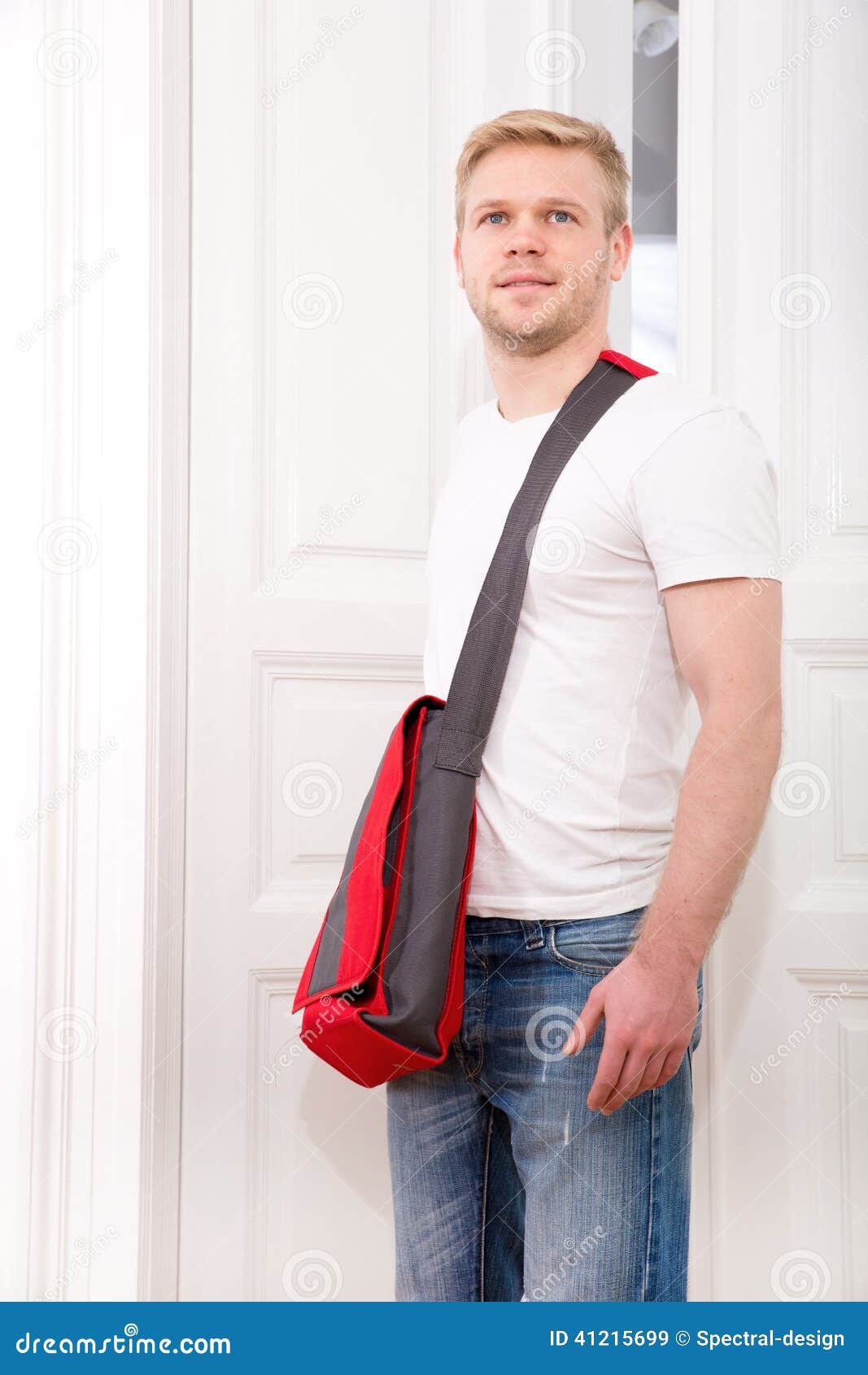 Young man coming home stock image. Image of blonde, house - 41215699