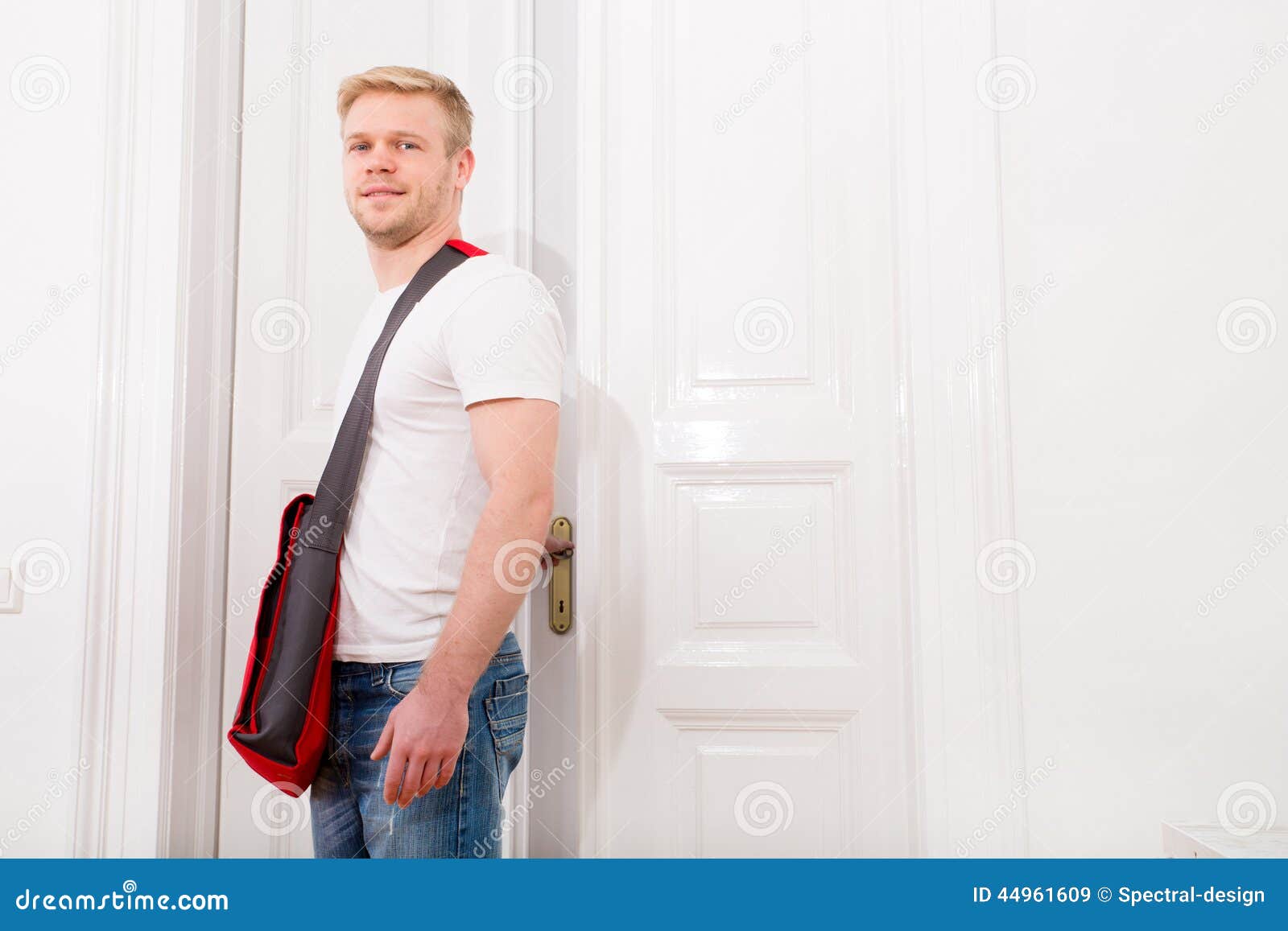 Young man coming home stock image. Image of attractive - 44961609