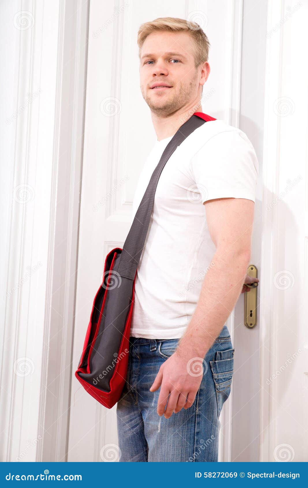 Young man coming home stock image. Image of carry, handsome - 58272069
