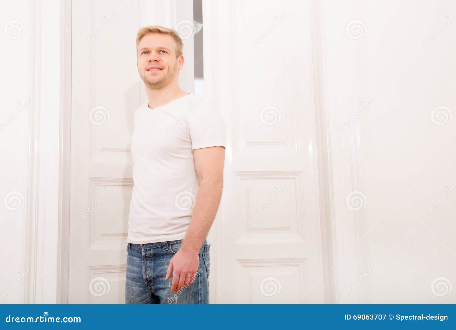 Young man coming home stock image. Image of entrance - 69063707