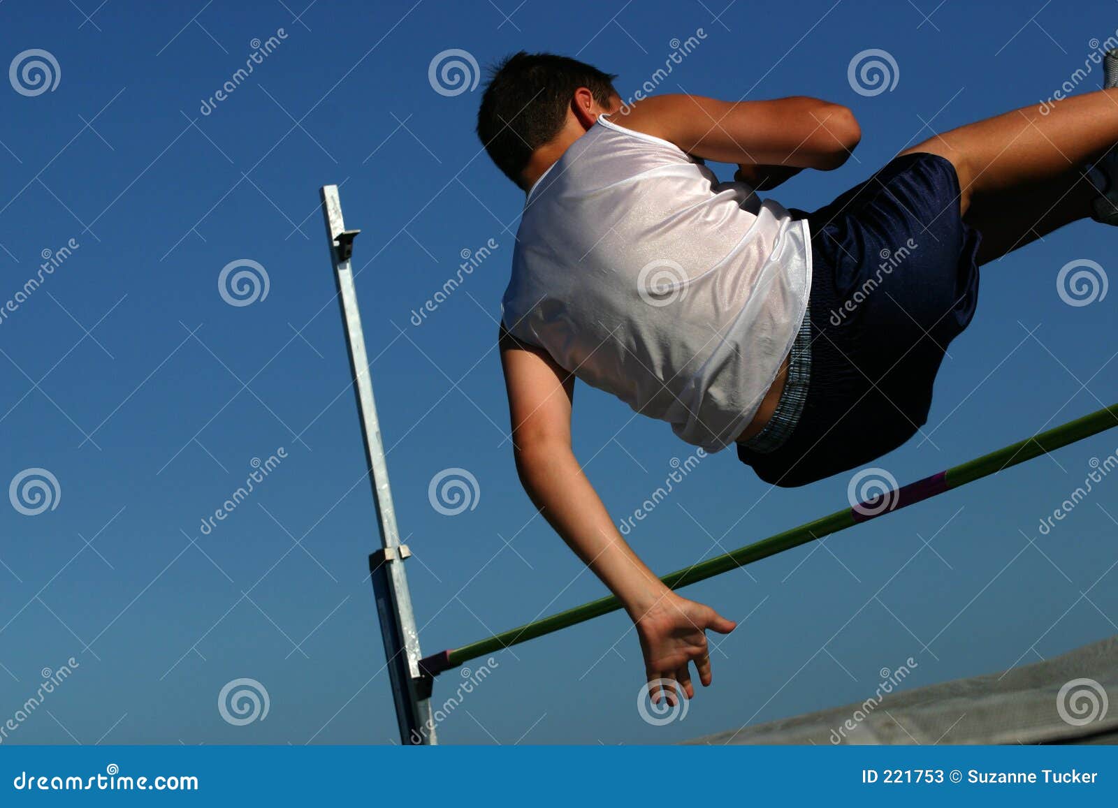 Young Man Competing in High Jump Stock Image - Image of active, child ...