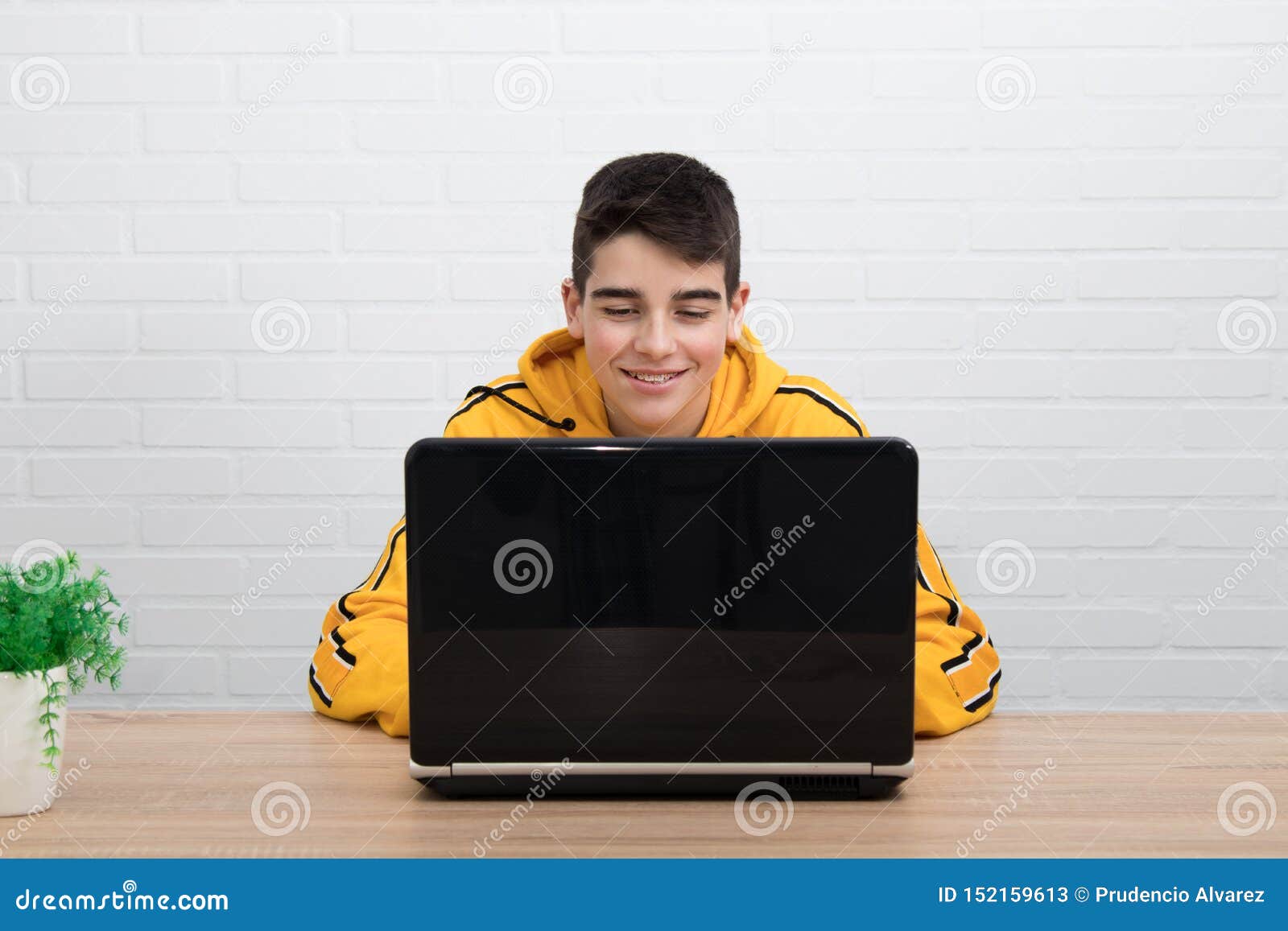 Young man with computer stock image. Image of computer - 152159613