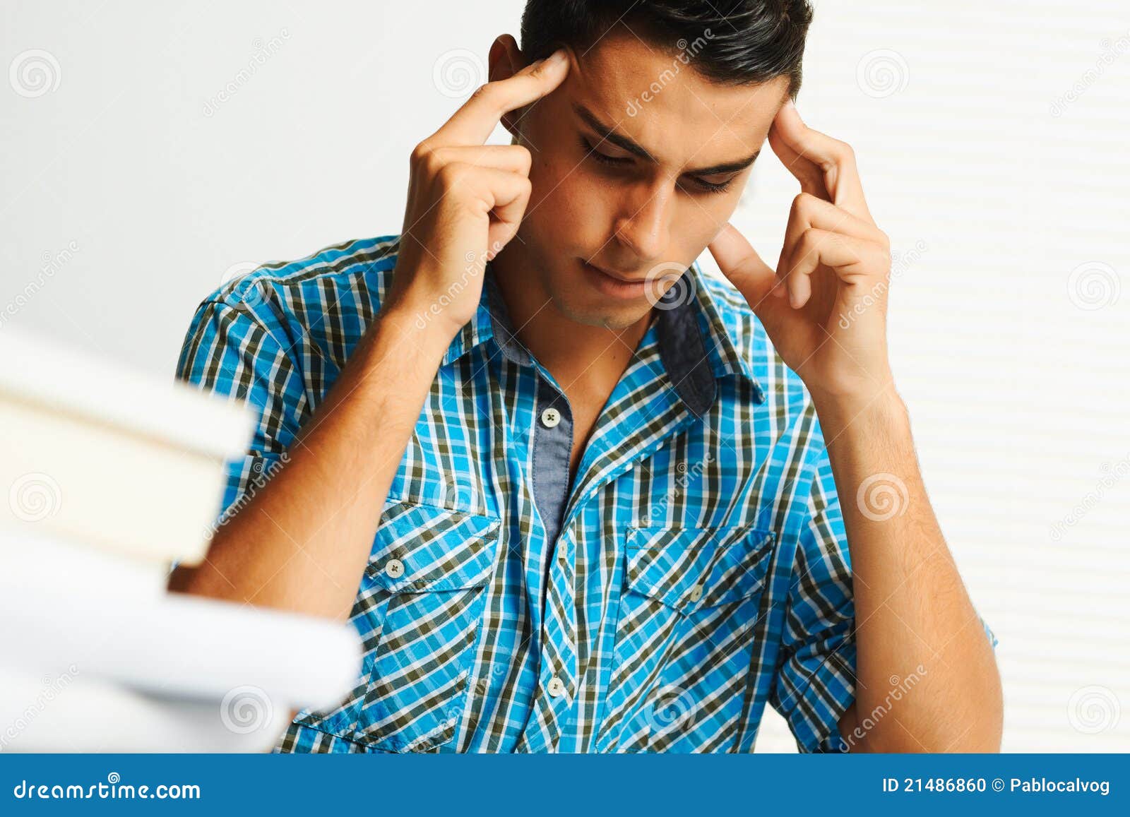 Young man concentrating stock photo. Image of smile, hispanic - 21486860