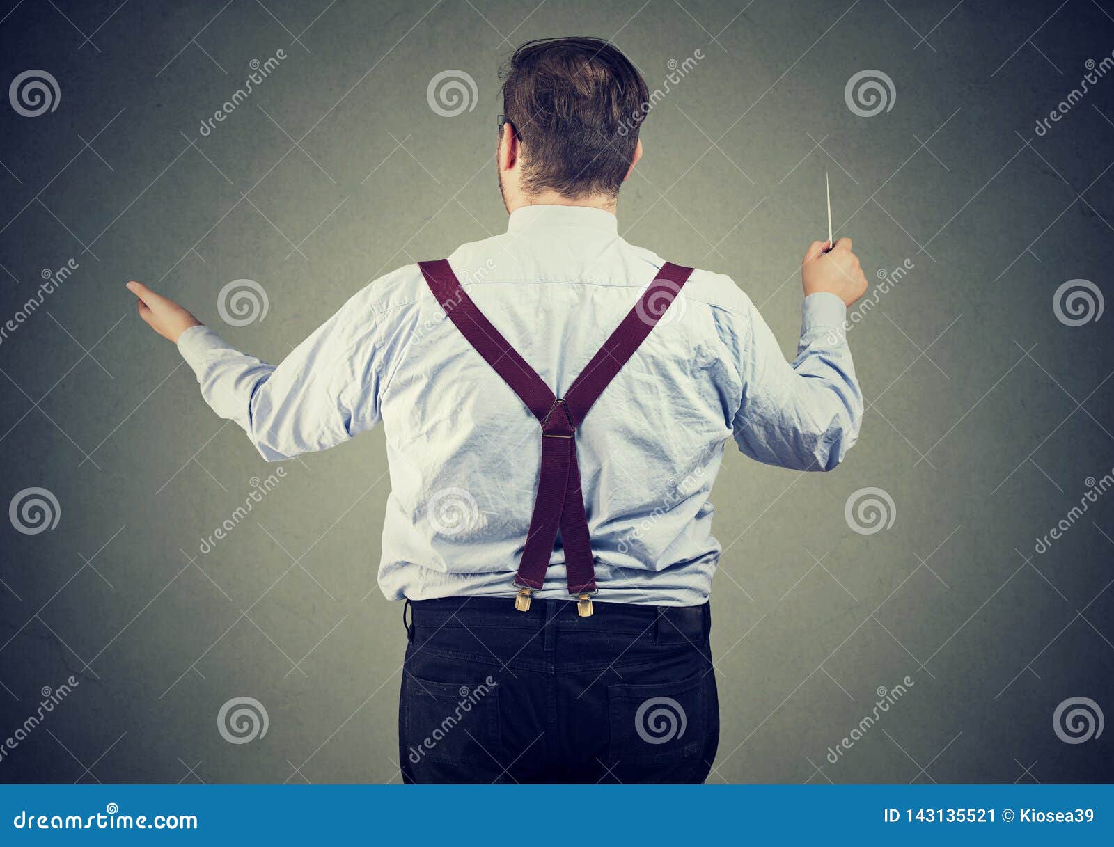 Young Man Conducting an Orchestra Stock Image - Image of conductor ...