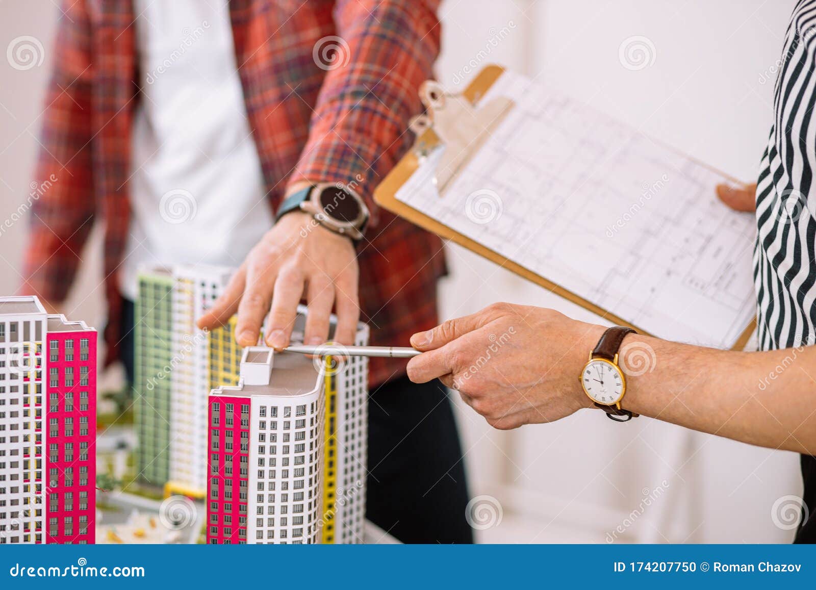 Young Man Constructs a New High-rise Building Stock Photo - Image of ...