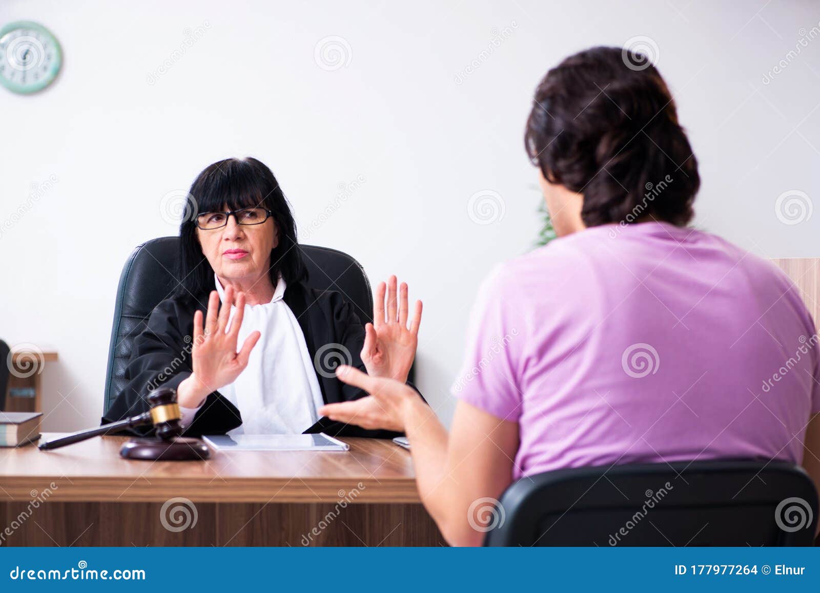 Young Man Consulting with Judge on Litigation Issue Stock Photo - Image ...