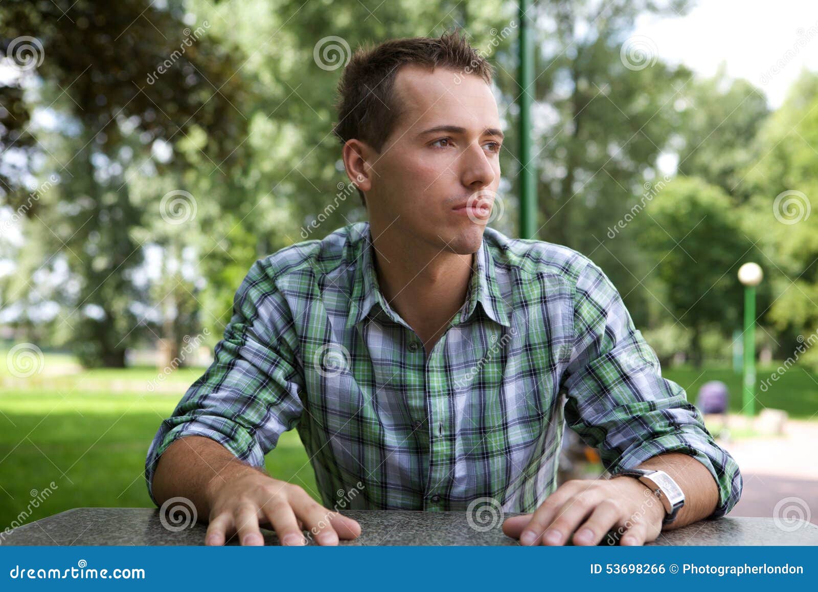 Young man contemplating stock photo. Image of front, serious - 53698266