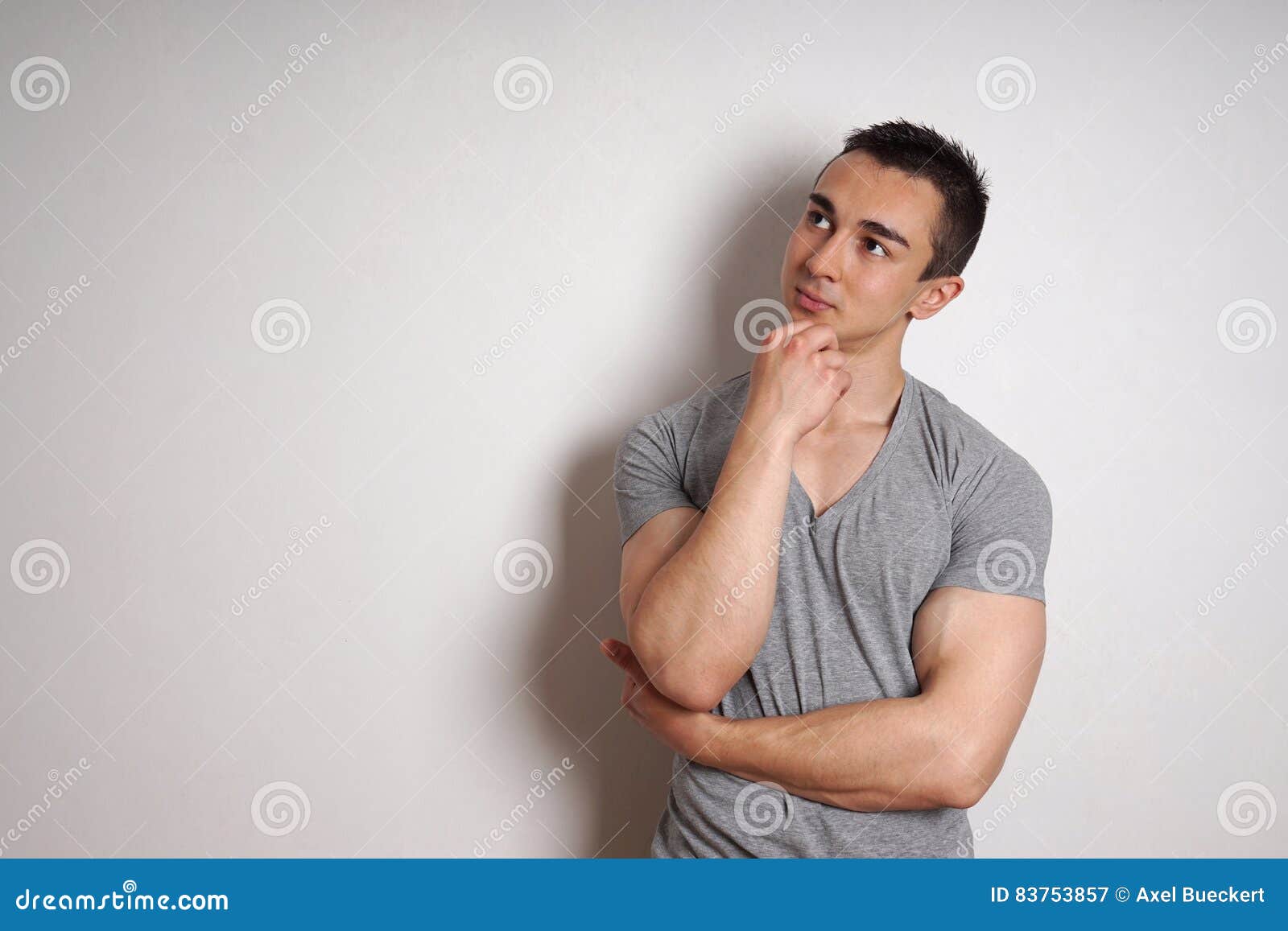 Young Man Contemplating an Idea Stock Image - Image of athletic, look ...