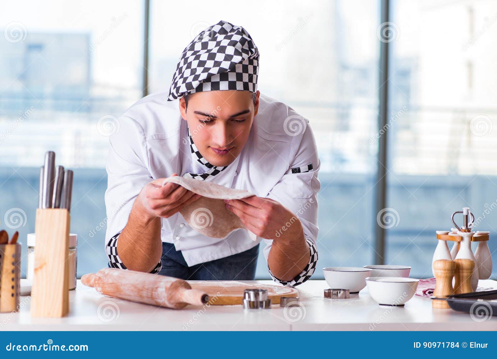 The Young Man Cooking Cookies in Kitchen Stock Photo - Image of baker ...