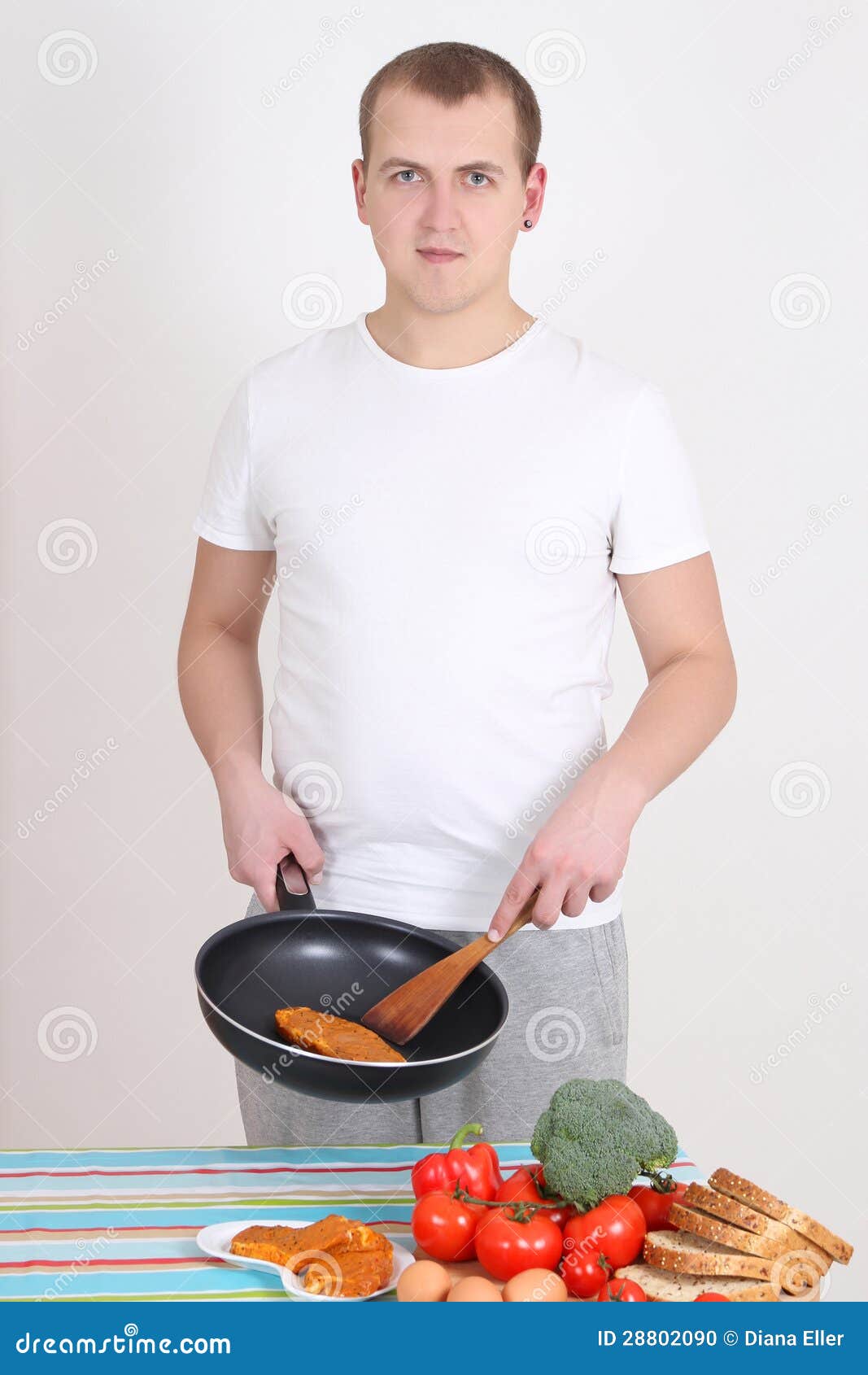 Young Man Cooking in the Kitchen Stock Photo - Image of cook, interior ...