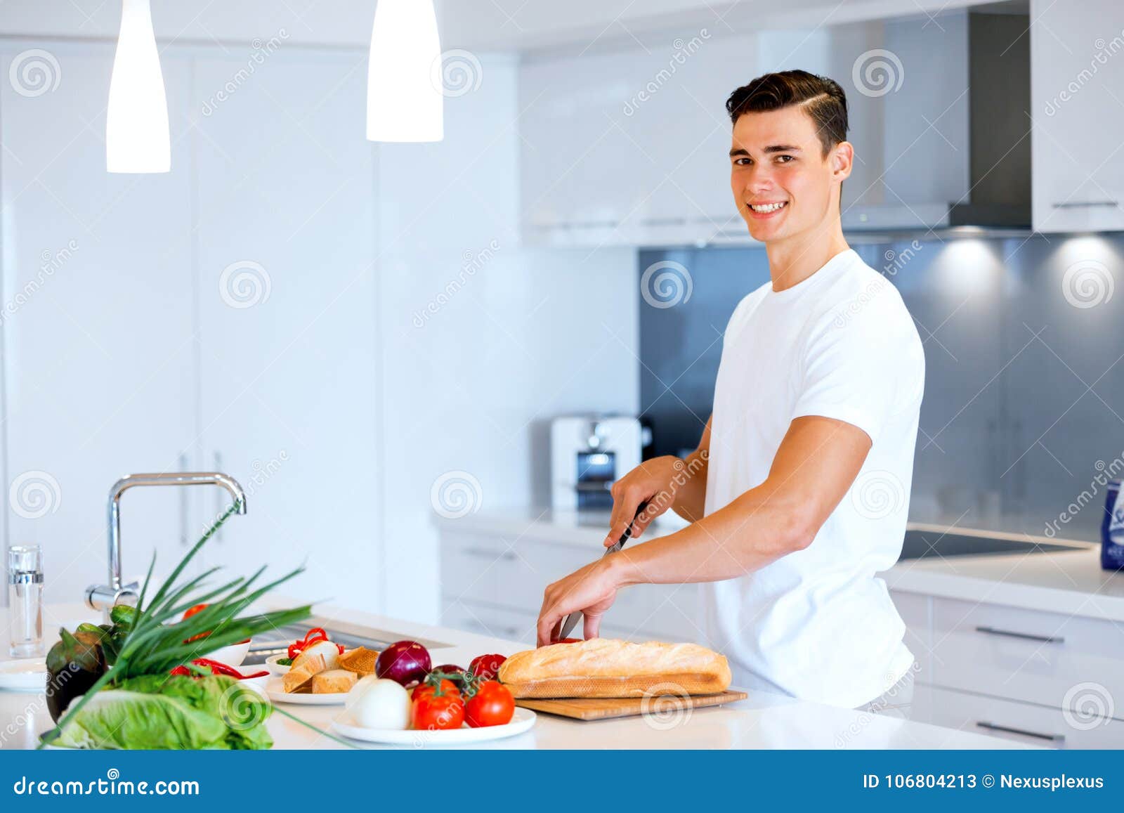 Young man cooking stock image. Image of dinner, cooking - 106804213