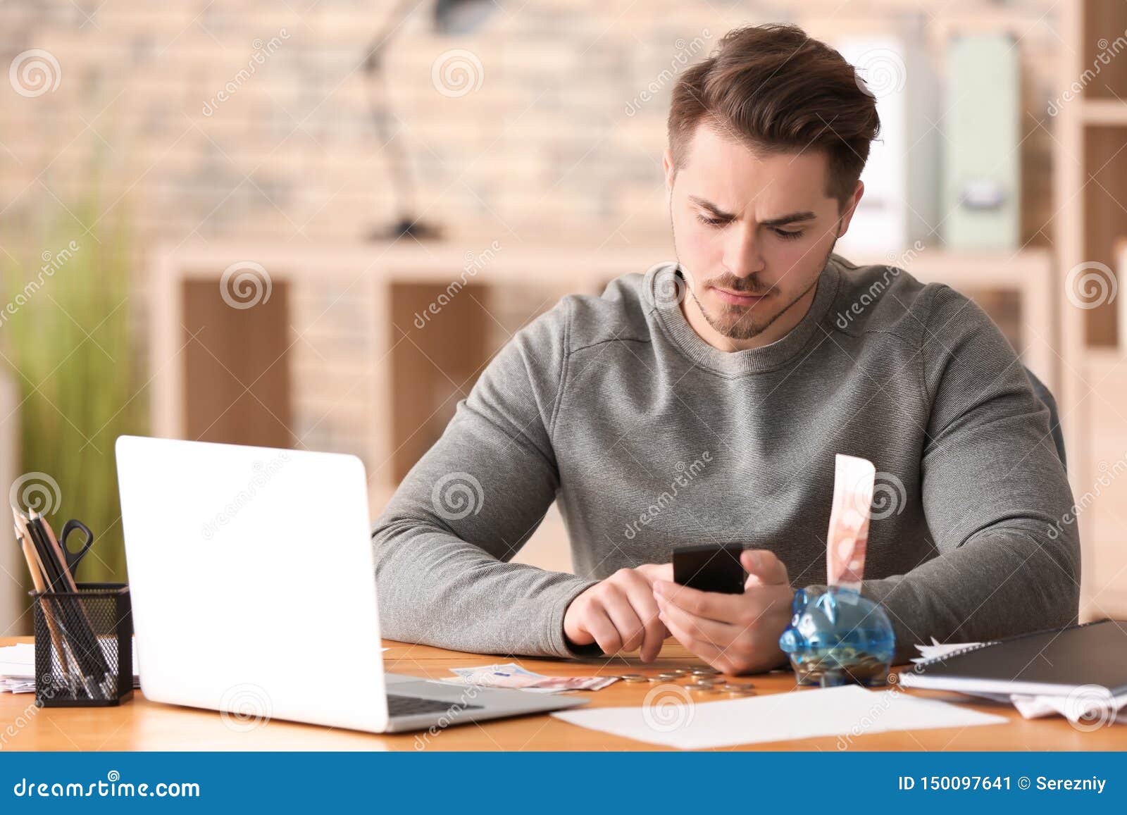 Young Man Counting Money at Table Indoors Stock Image - Image of fund ...