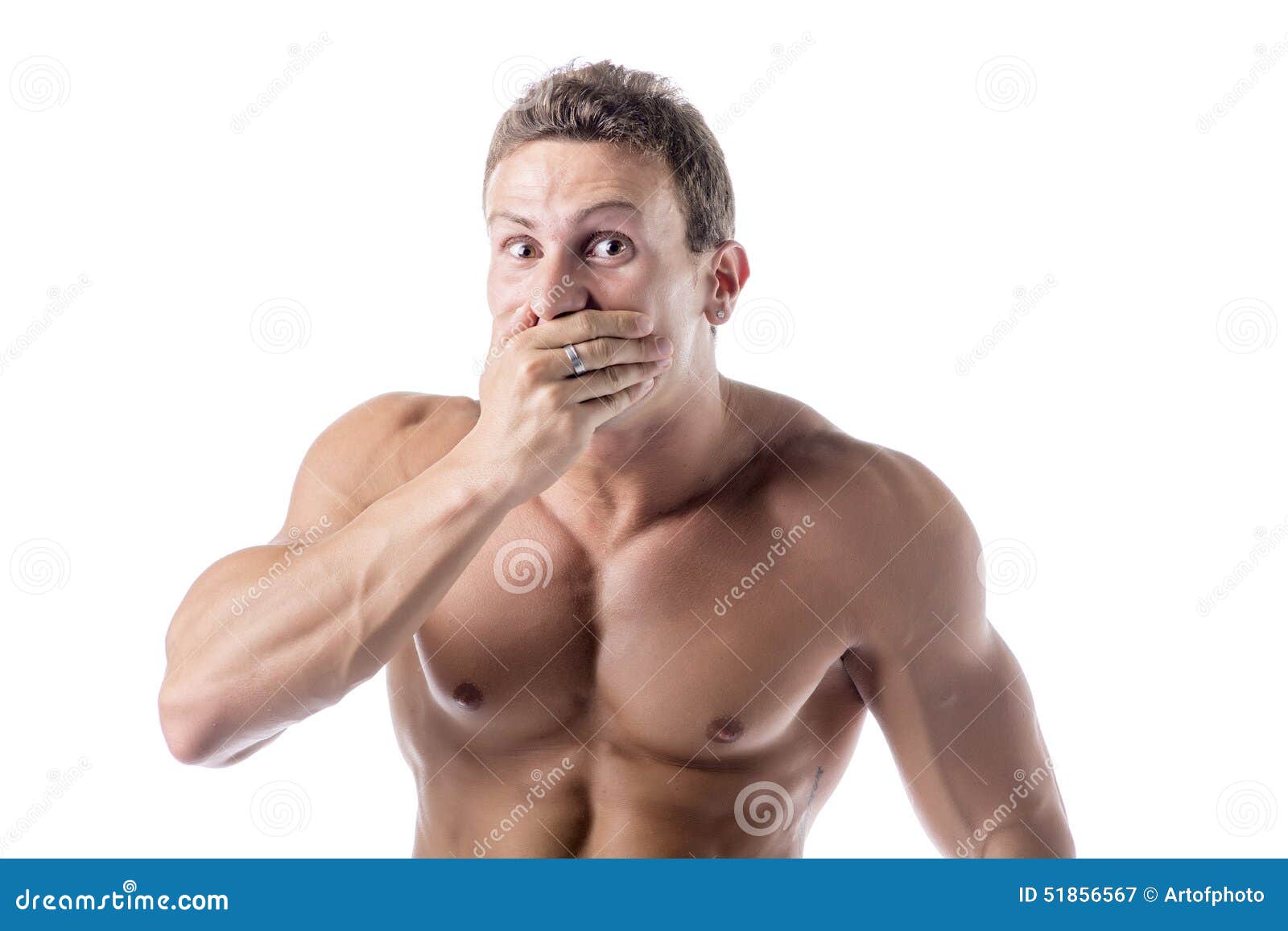 Young Man Covering His Mouth With Hand Not Laughing Or In Silence