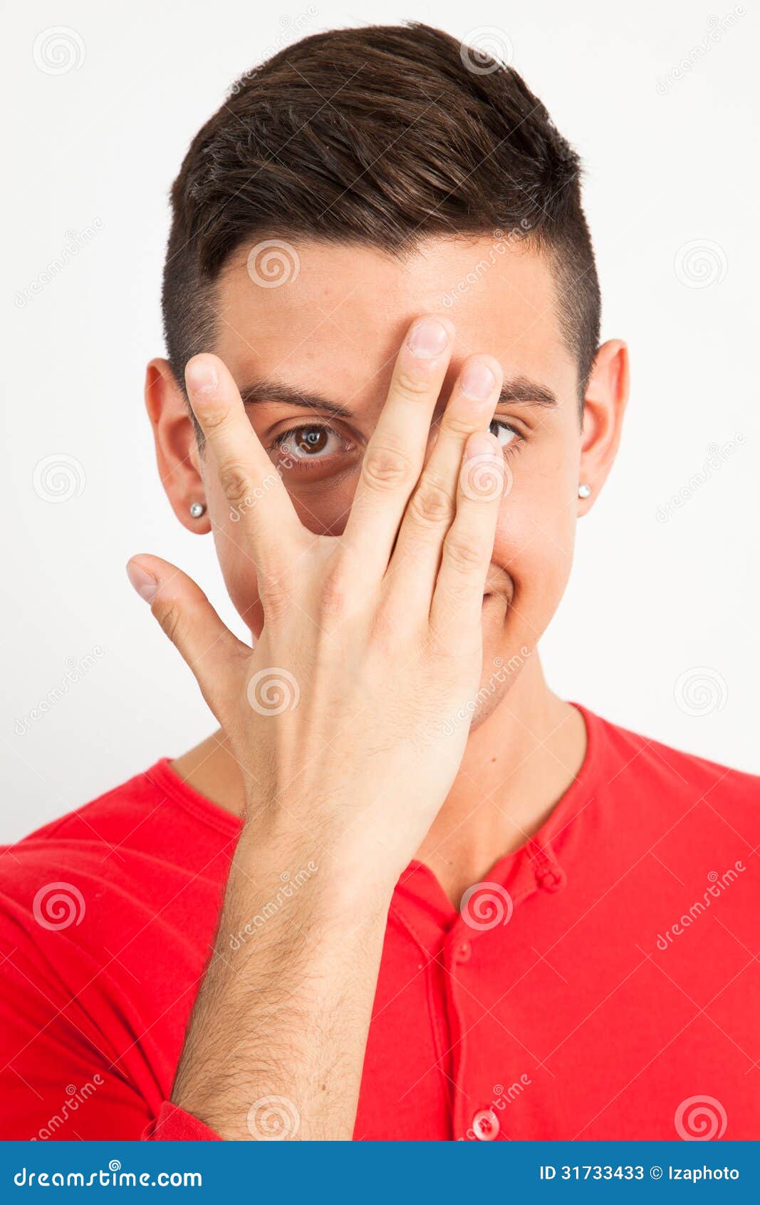 Young man covering one eye stock image. Image of male - 31733433