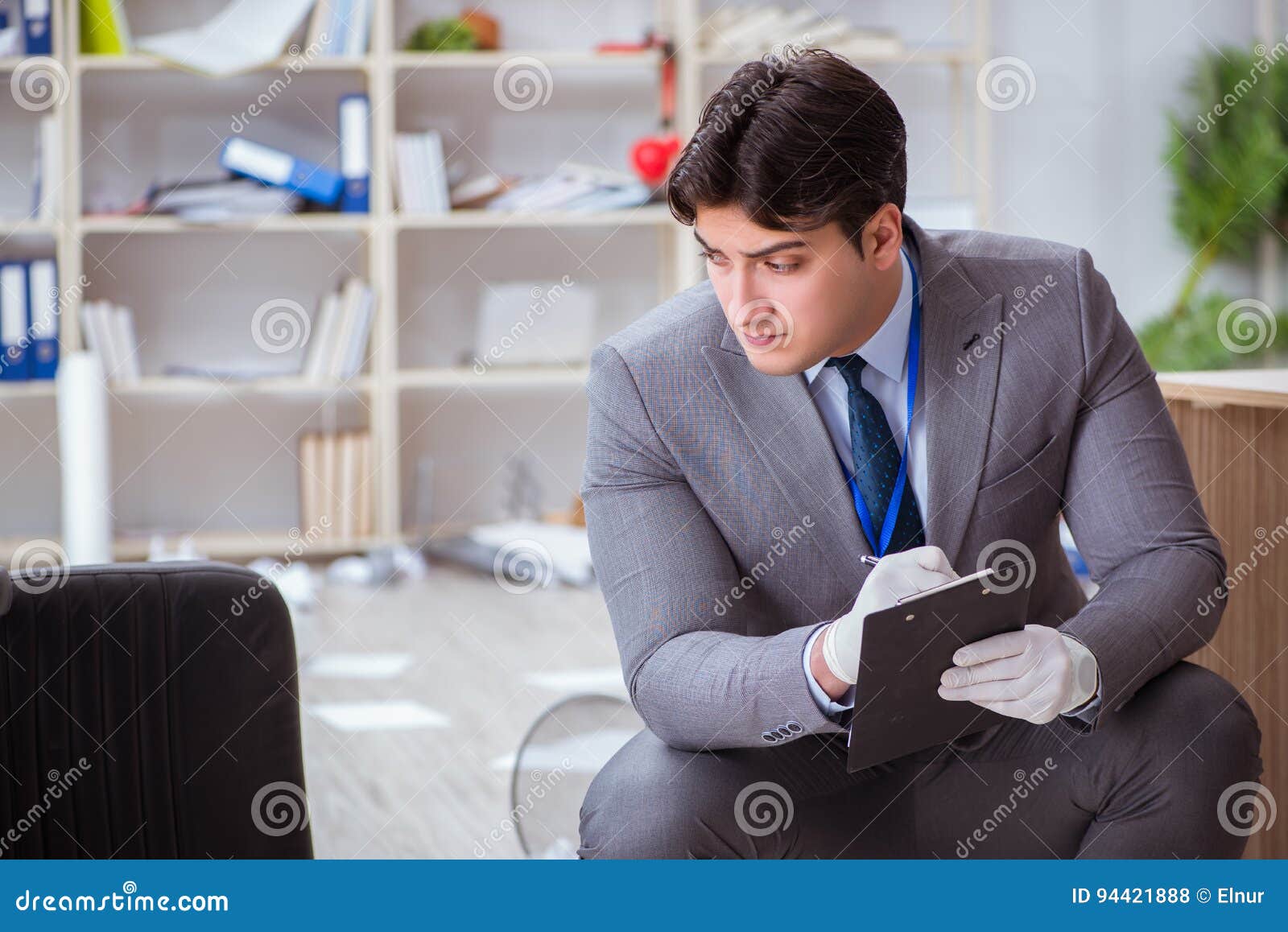 The Young Man during Crime Investigation in Office Stock Photo - Image ...