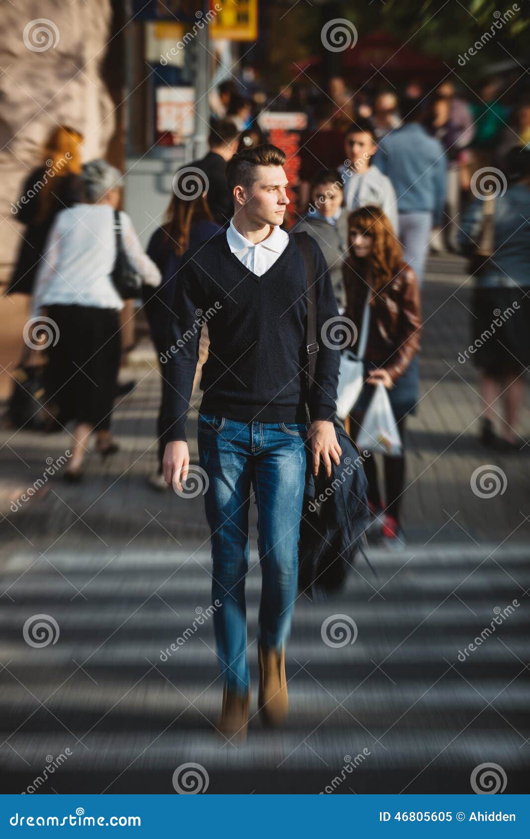 Young man cross the street stock image. Image of white - 46805605