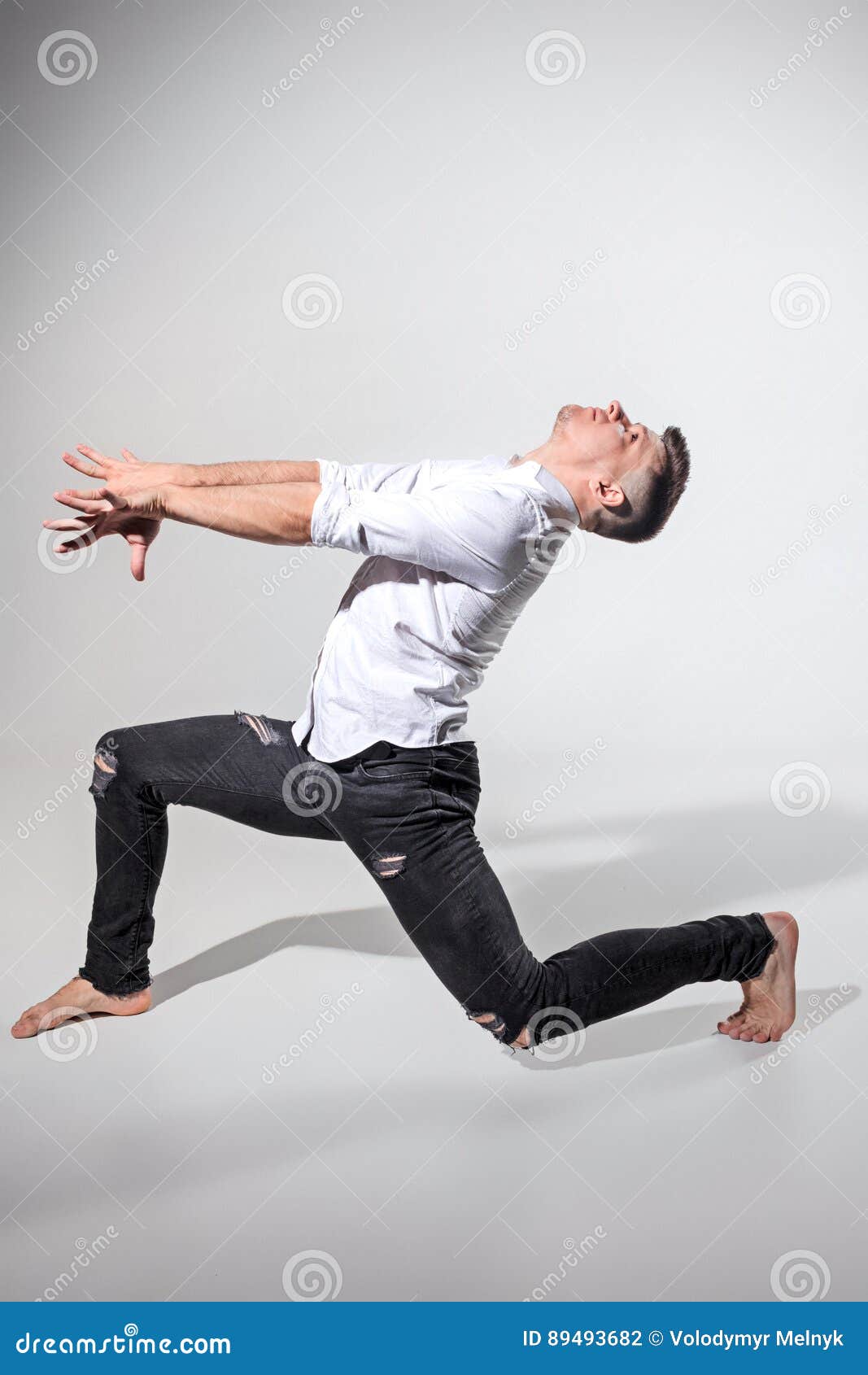 The Young Man Dancing on Gray Stock Photo - Image of performing, dancer ...