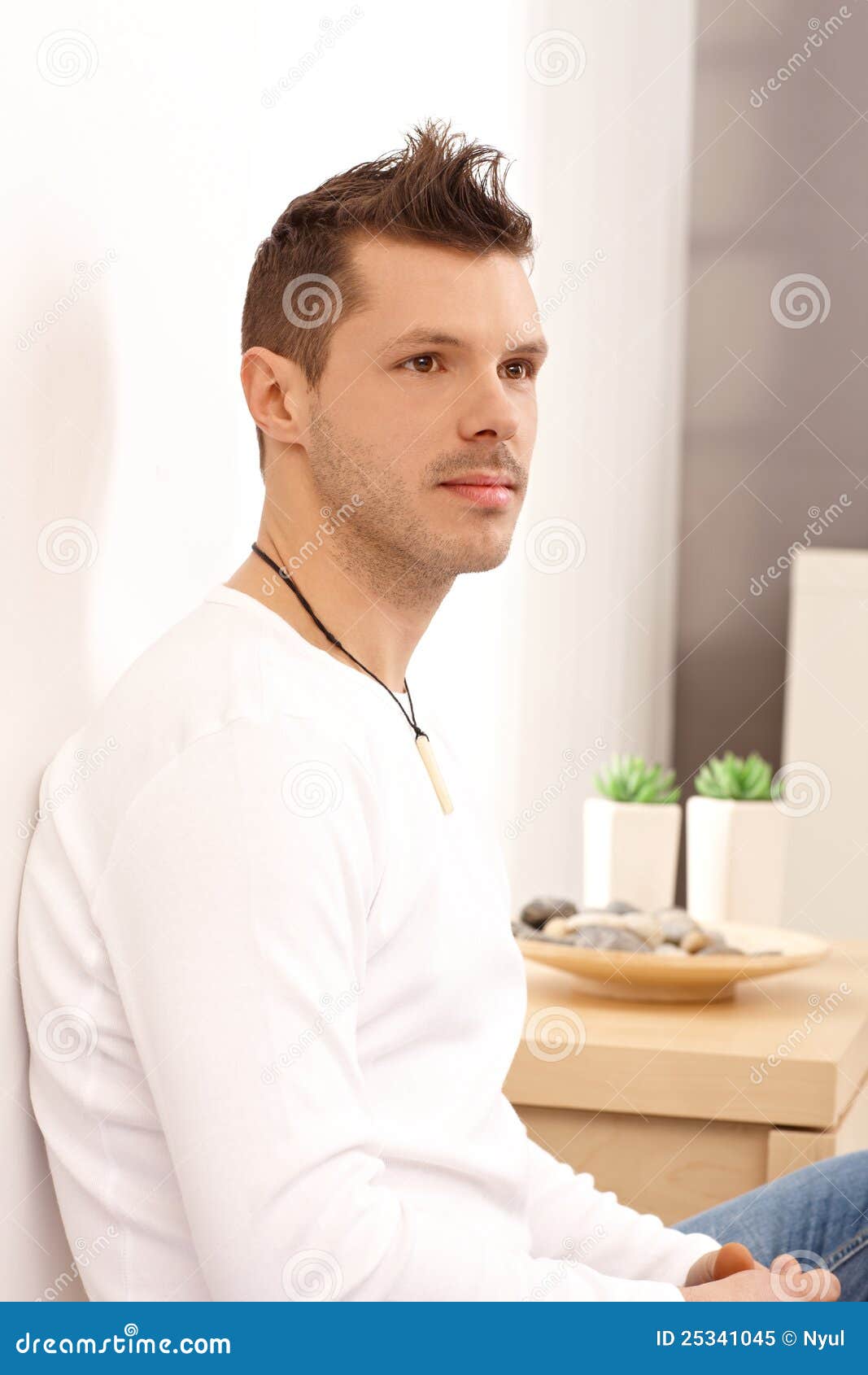 Young Man Daydreaming at Home Stock Image - Image of hair, color: 25341045