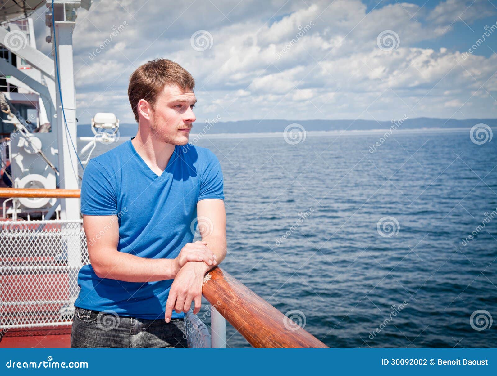 The Young Man on the Deck Against the Sea Stock Photo - Image of ...