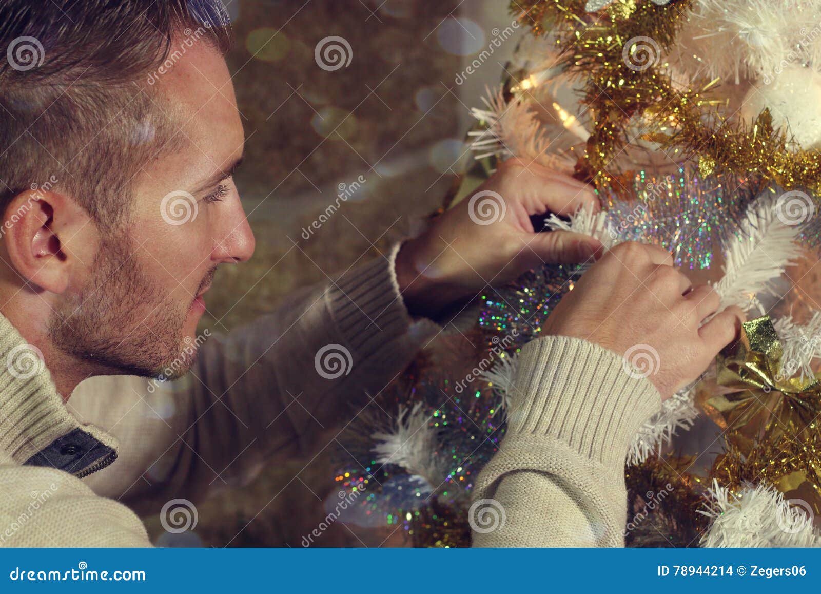 Young Man Decorating a Christmas Tree Stock Photo - Image of tree ...