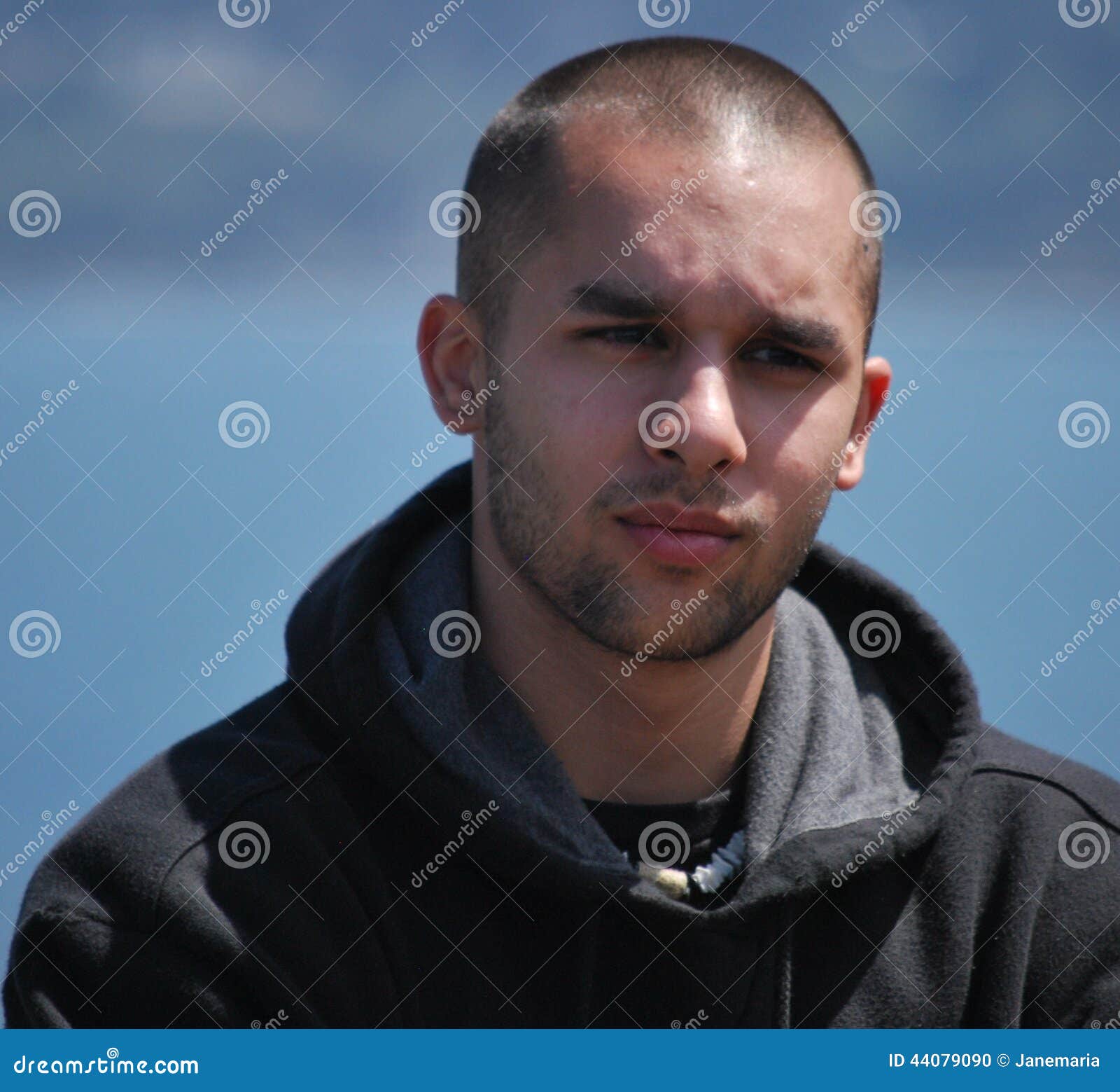 Young Man in Deep Thought stock photo. Image of pondering - 44079090
