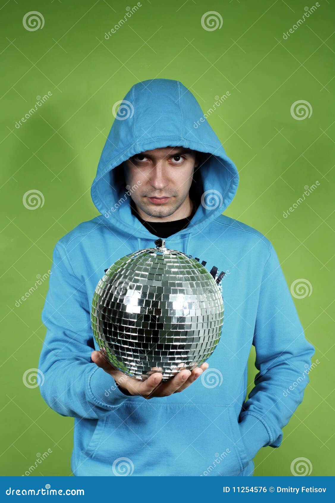 Young man with a discoball stock photo. Image of reflection - 11254576