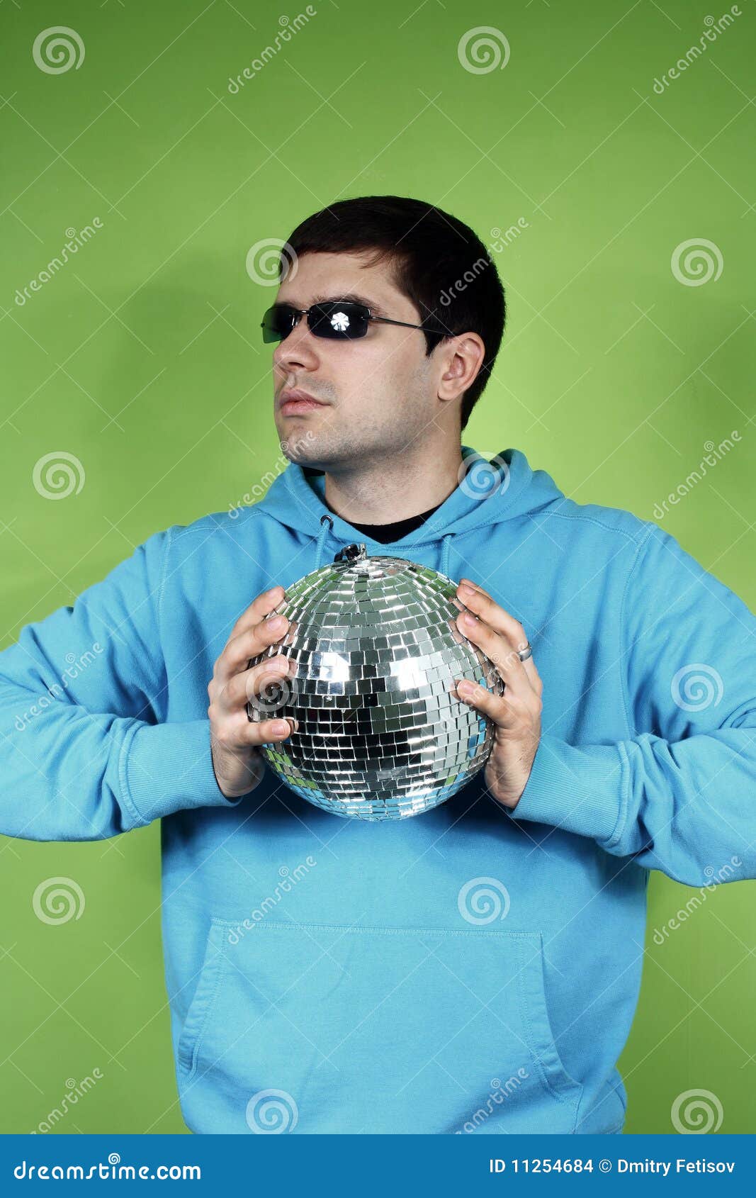 Young man with a discoball stock photo. Image of disco - 11254684