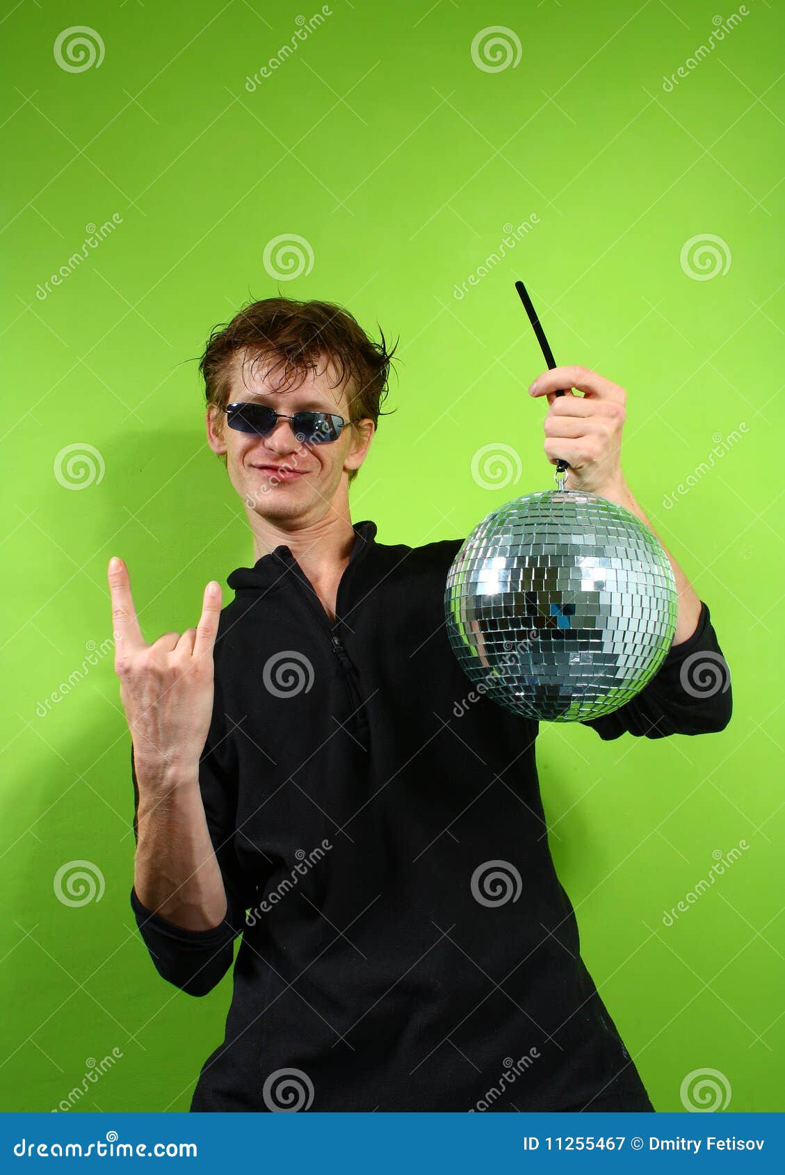 Young man with a discoball stock image. Image of adult - 11255467