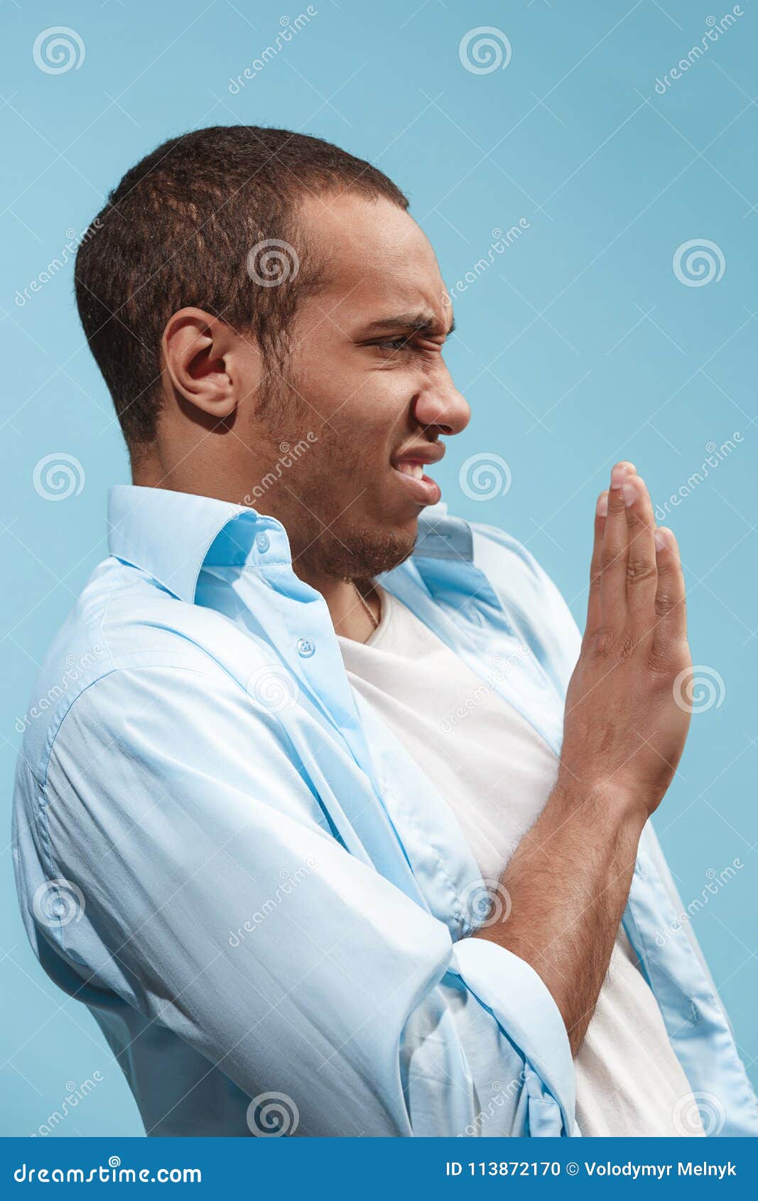 Young Man with Disgusted Expression Repulsing Something, Isolated on ...