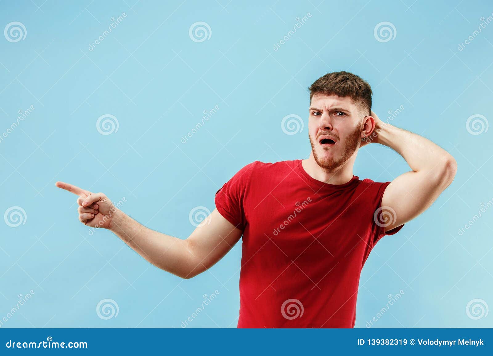 Young Man with Disgusted Expression Repulsing Something, Isolated on ...