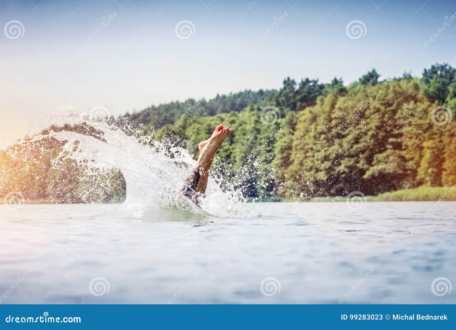 Young Man Diving into a Lake. Stock Image - Image of lake, diving: 99283023