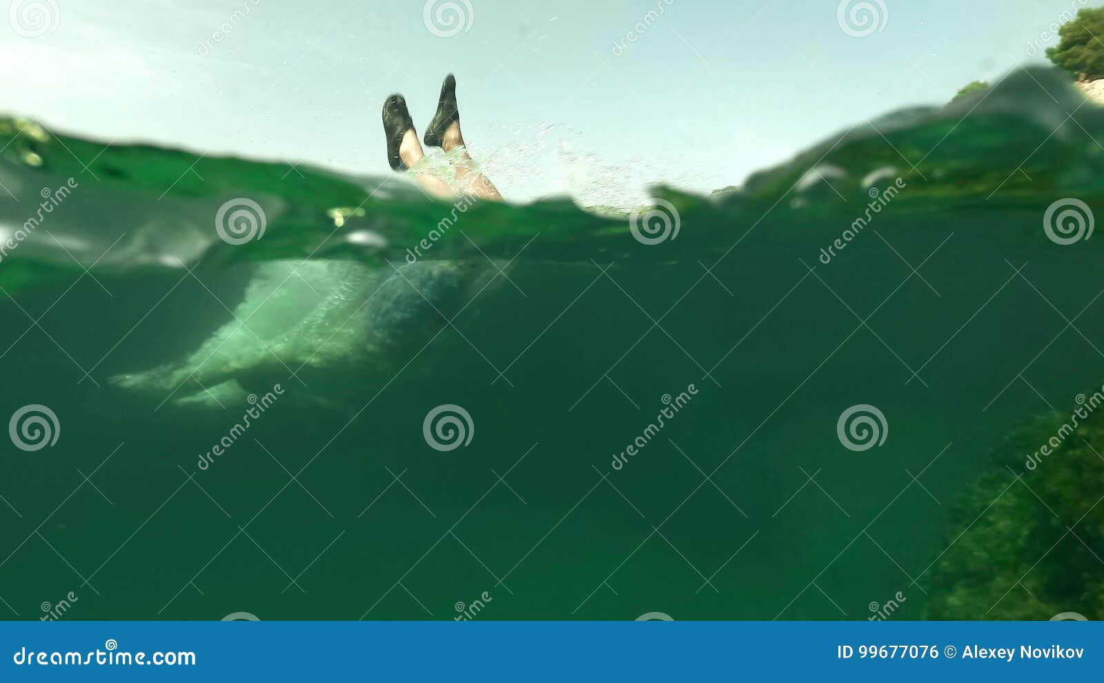 Young Man Diving into the Sea, Waterline Shot Stock Photo - Image of ...