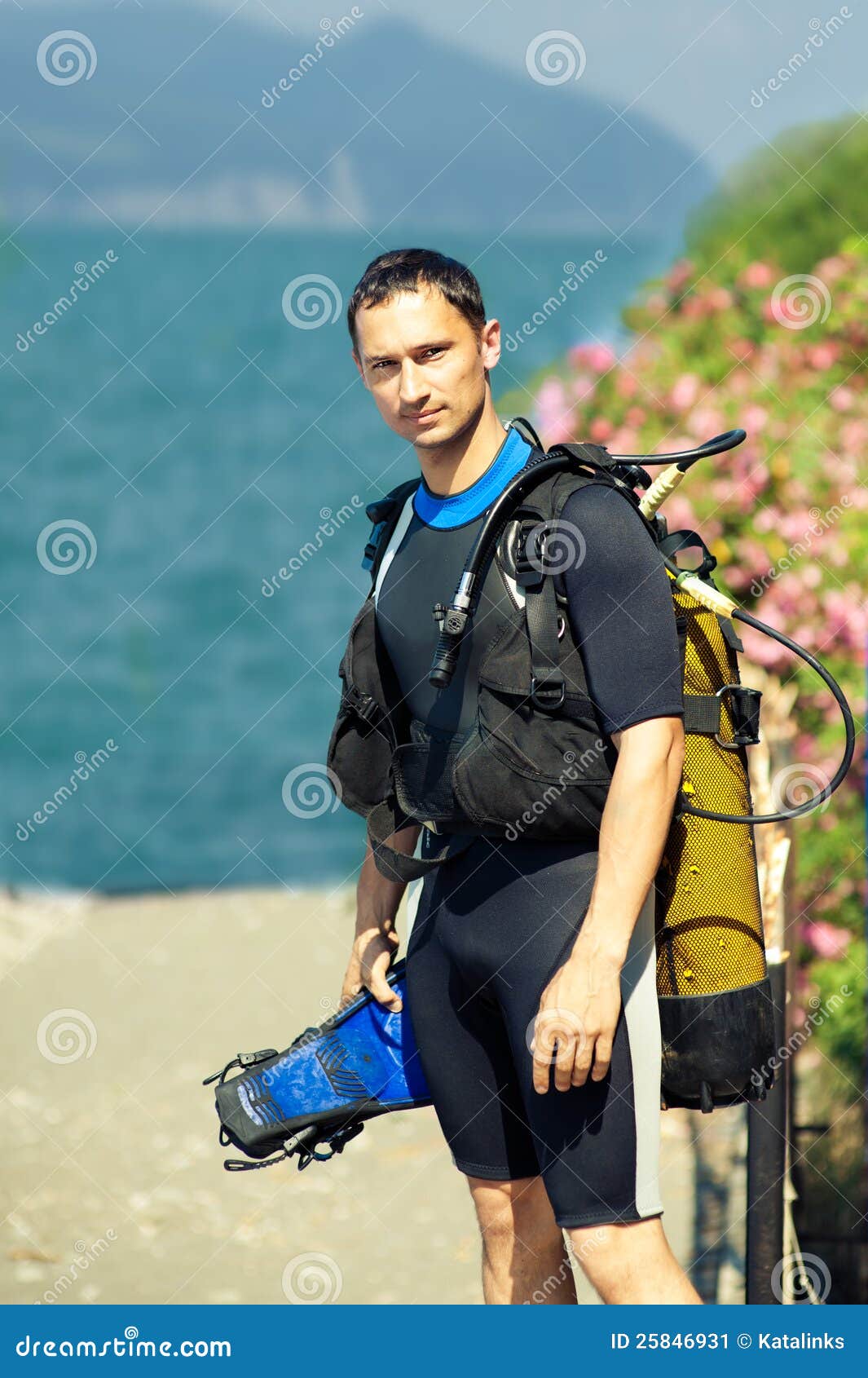 Young man in a diving suit stock image. Image of adult - 25846931