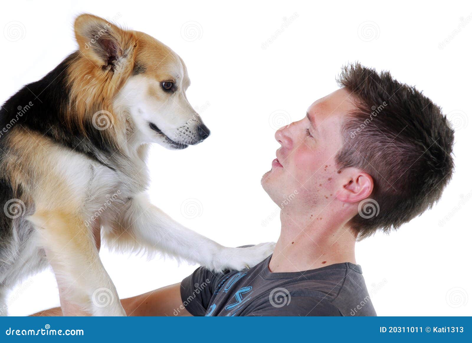 Young man with dog stock image. Image of carry, mixed - 20311011