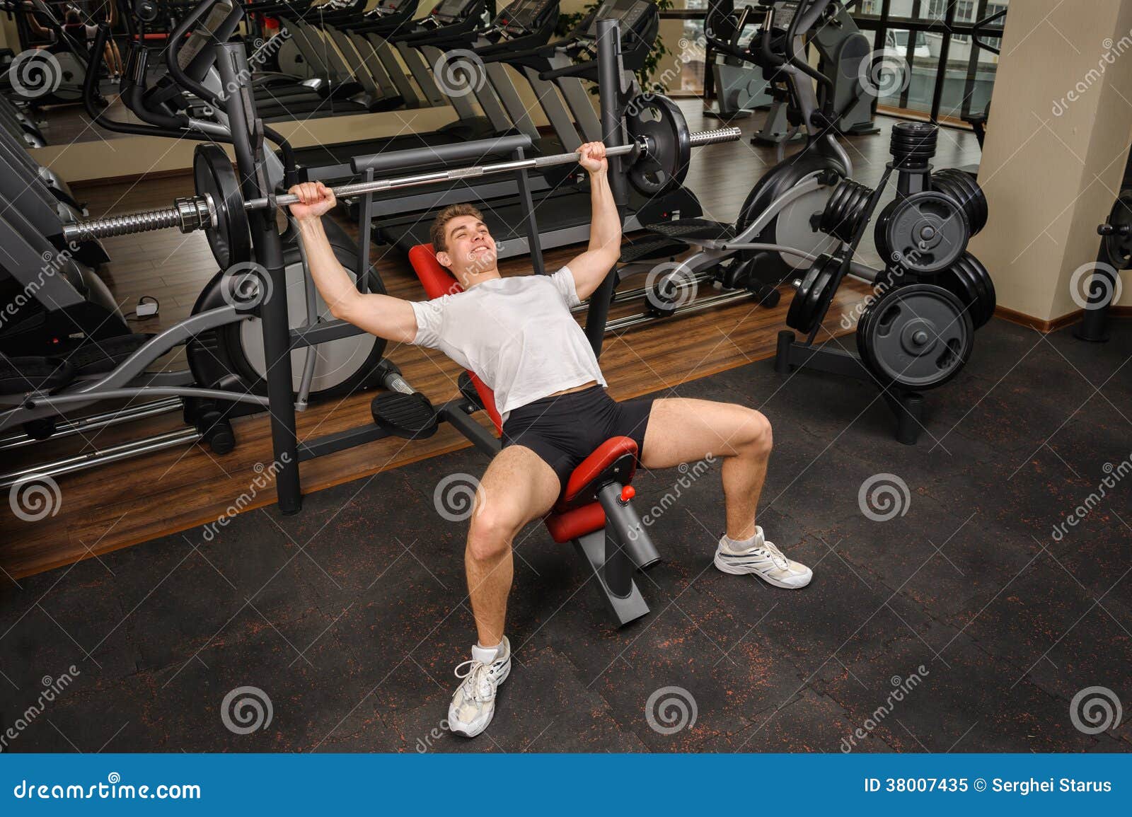 Young Man Doing Barbell Incline Bench Press Workout in Gym Stock Image ...