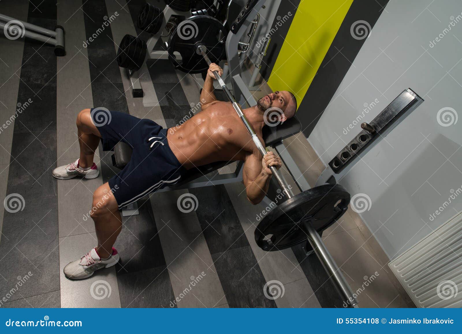 Young Man Doing Bench Press Exercise for Chest Stock Photo - Image of ...