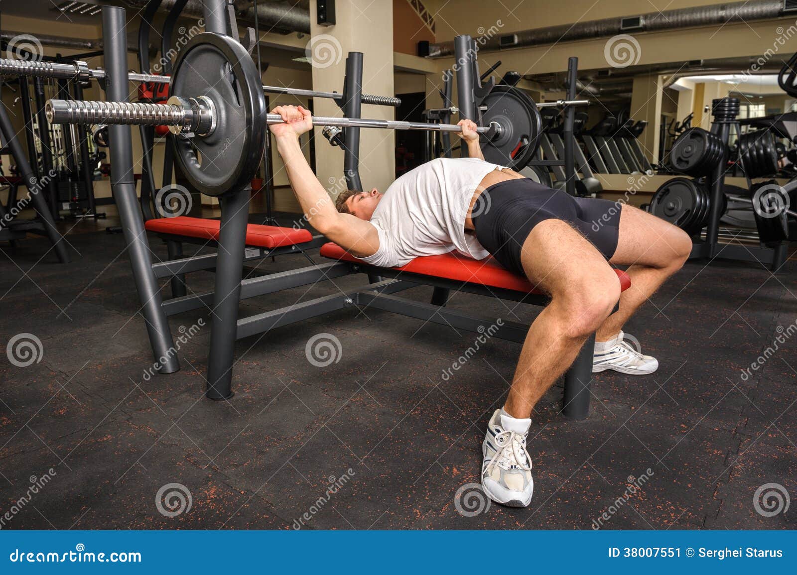 Young Man Doing Bench Press Workout in Gym Stock Image - Image of ...
