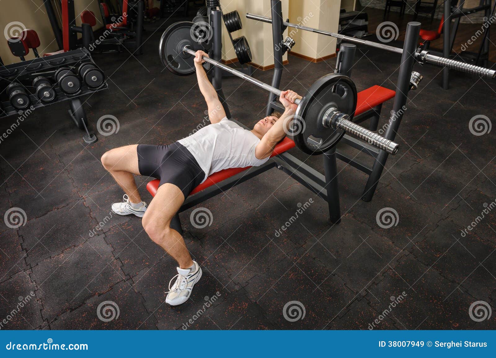 Young Man Doing Bench Press Workout in Gym Stock Image - Image of ...