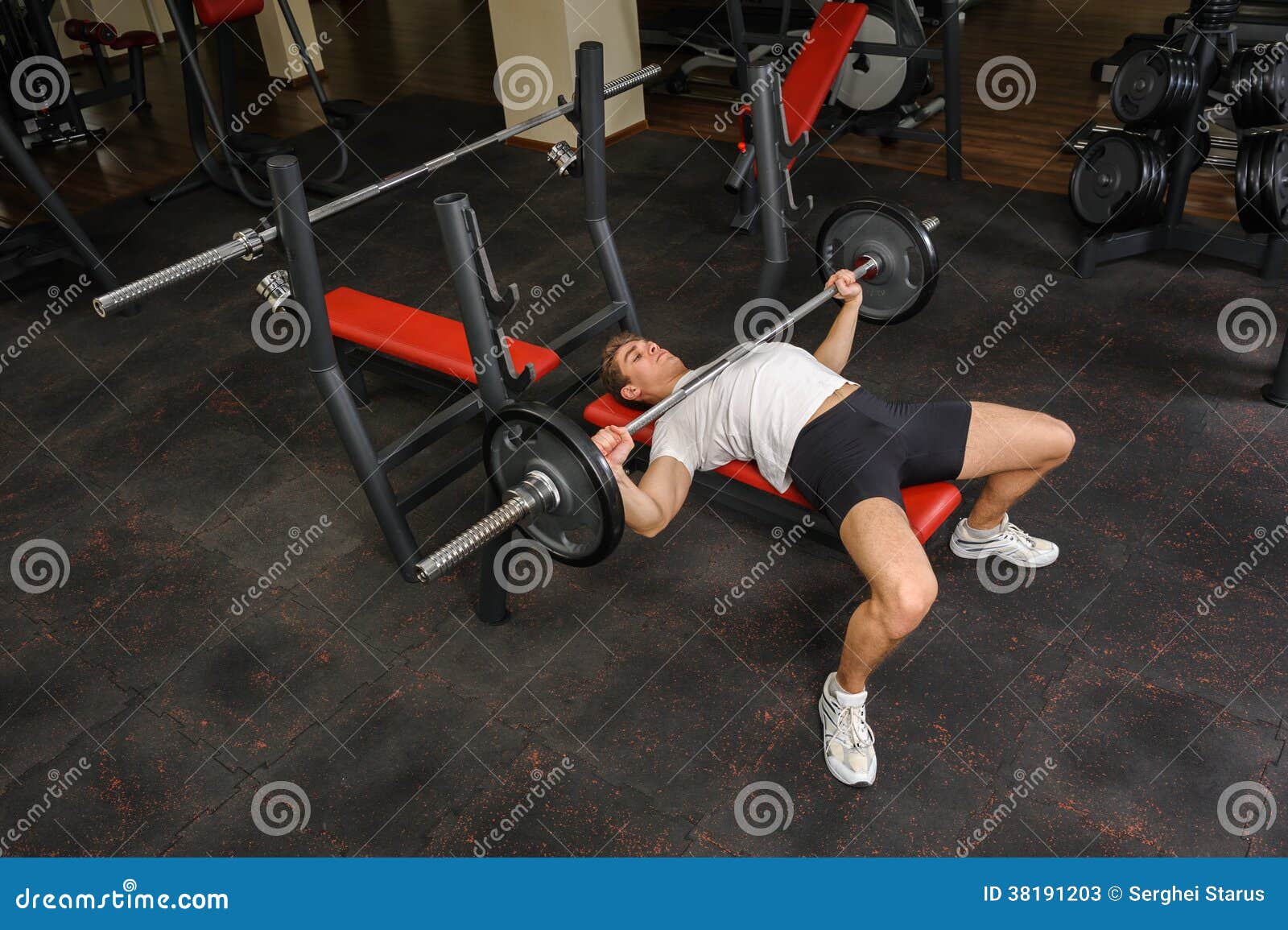 Young Man Doing Bench Press Workout in Gym Stock Image - Image of ...