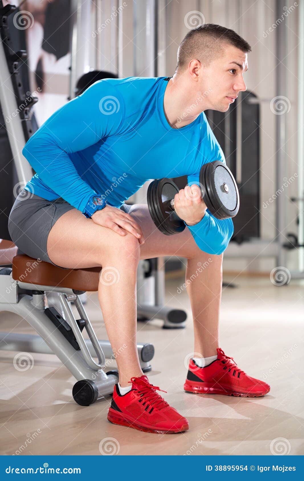 Young Man Doing Bodybuilding Exercise Stock Photo - Image of exercising ...