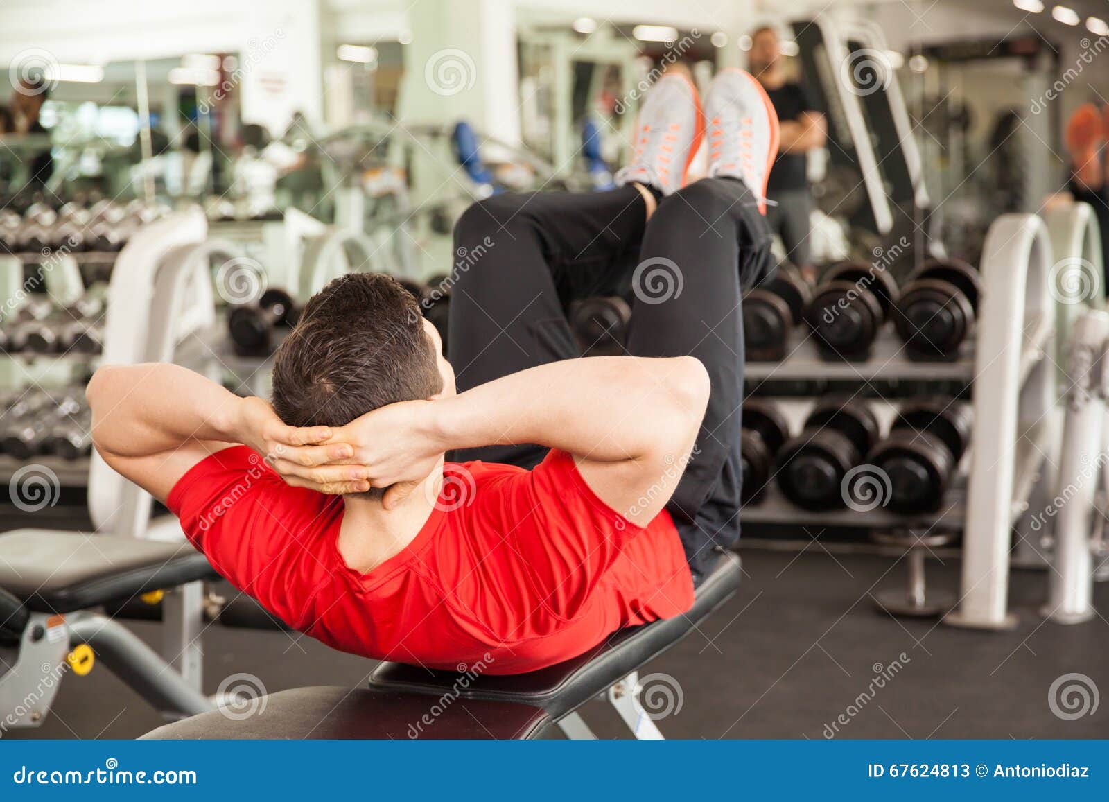 Young Man Doing Crunches on a Bench Stock Image - Image of health, core ...