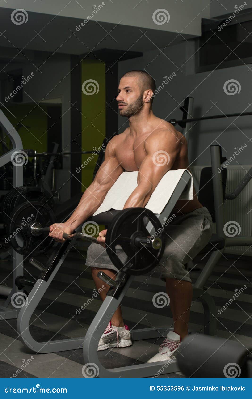 Young Man Doing Exercise for Biceps Stock Photo - Image of bodybuilding ...