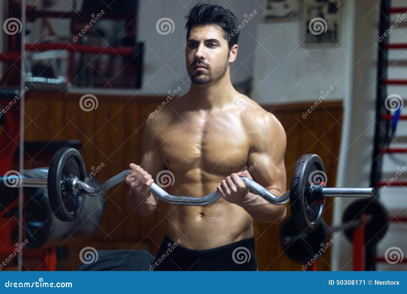 Young Man Doing Heavy Weight Exercise in Gym. Stock Image - Image of ...