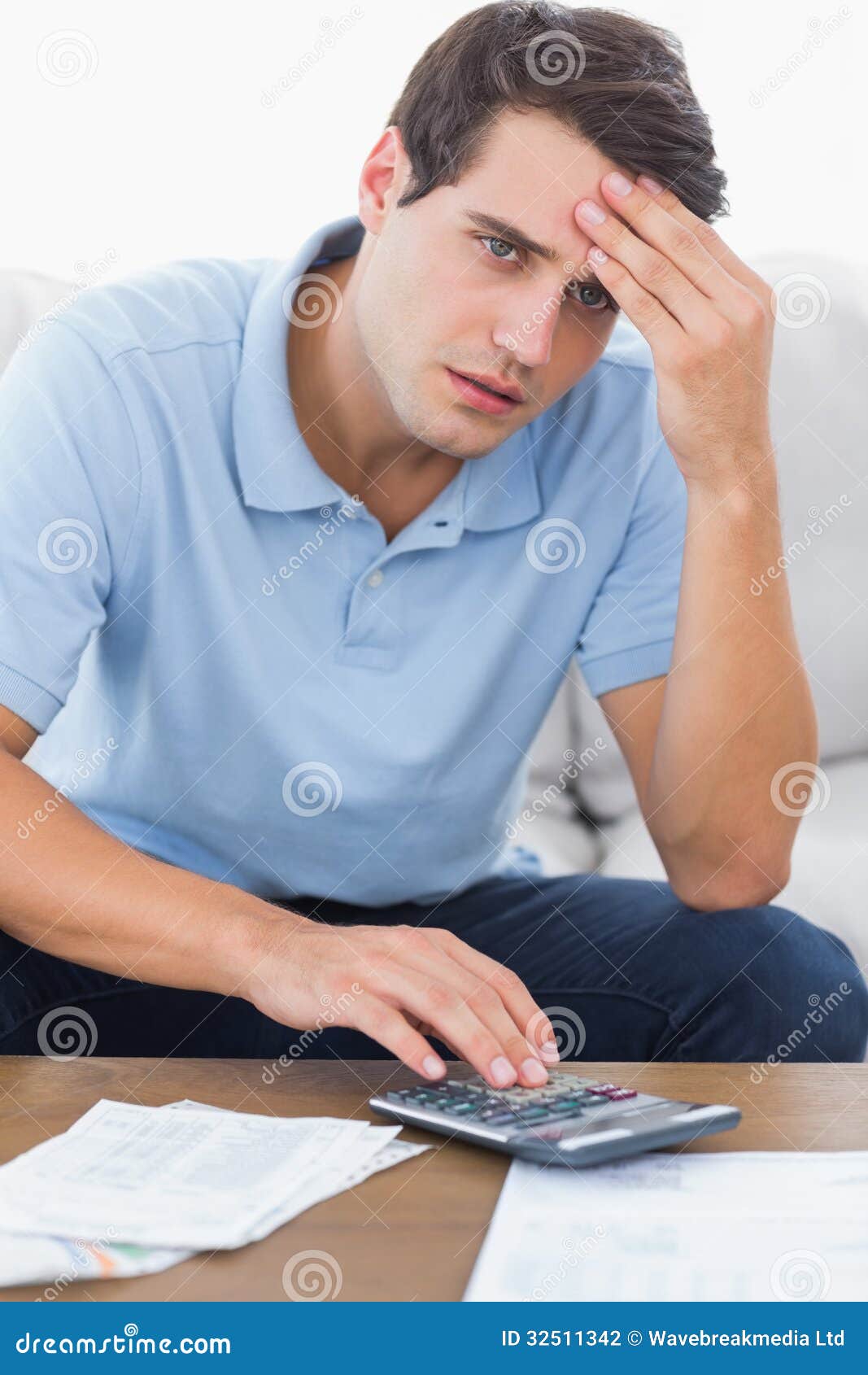 Young Man Doing His Accounts Stock Photo - Image of bills, invoices ...