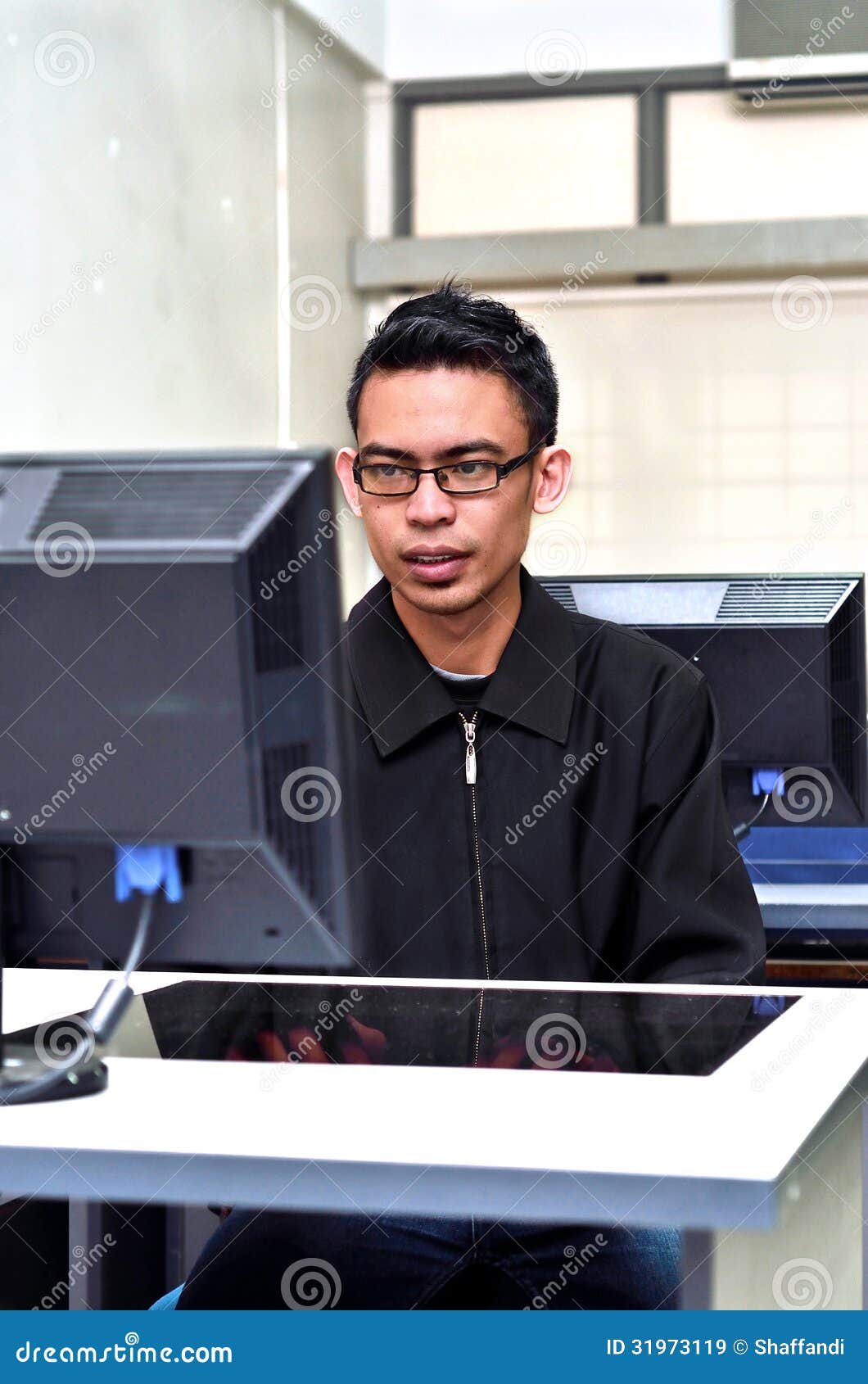 Young man doing his works stock image. Image of lecturer - 31973119